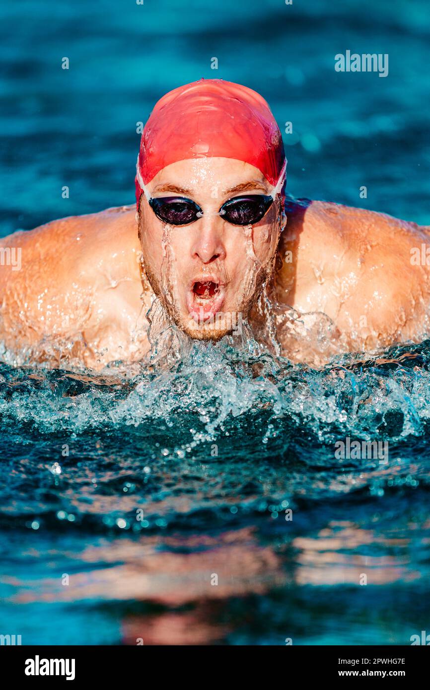 Man Swimming. Male Swimmer athlete doing butterfly swim stroke. Male ...