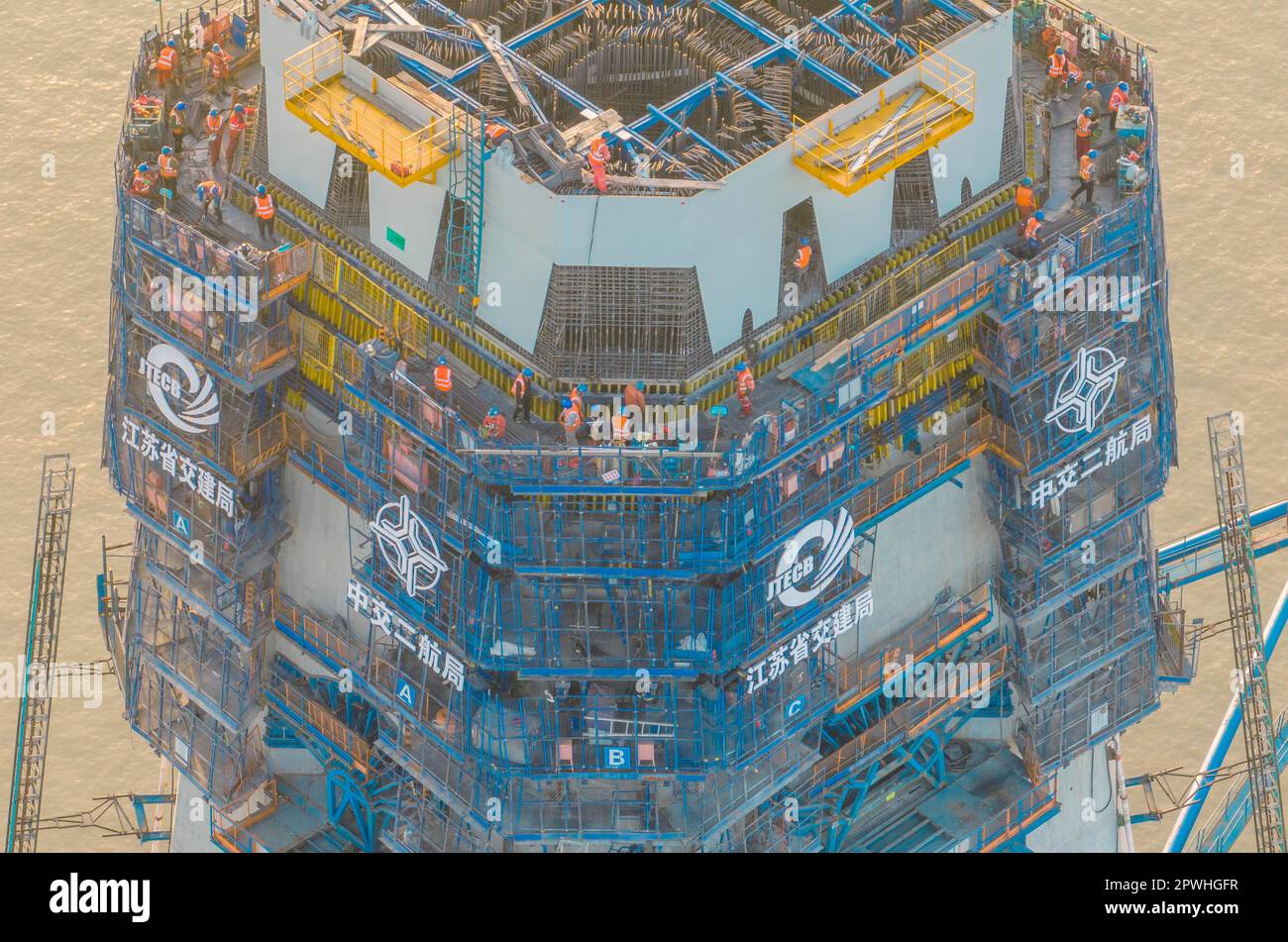 TAIZHOU, CHINA - MAY 1, 2023 - Workers tie up steel bars at the main ...