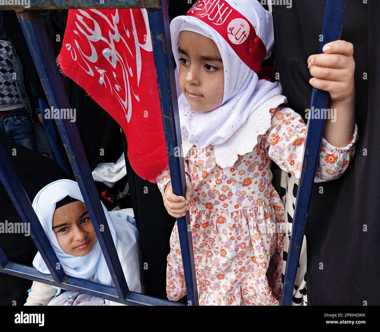 Two little girls are seen participating in the event. The birth of the ...