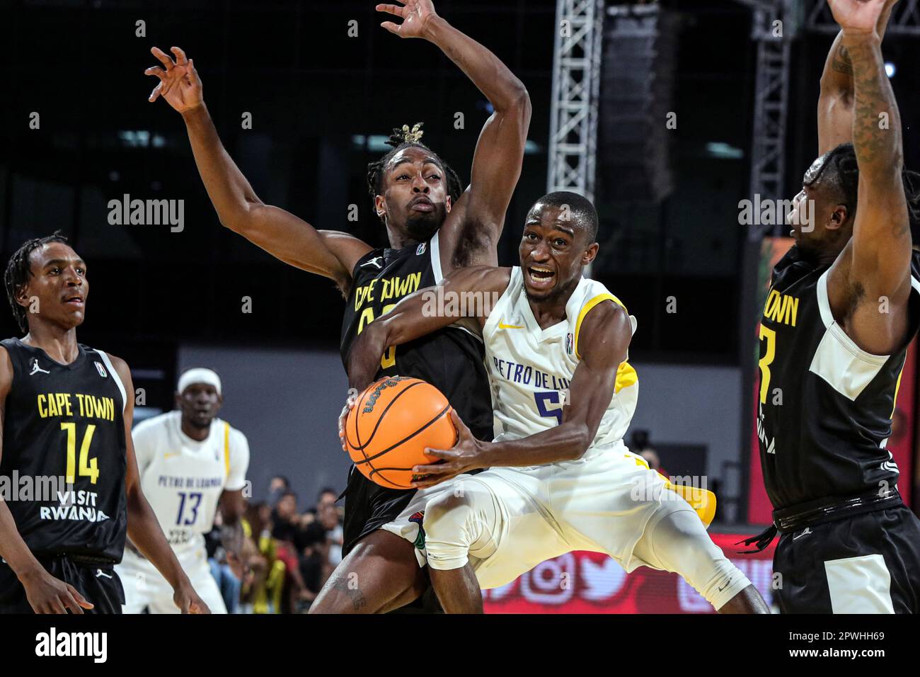 Cairo, Egypt. 30th Apr, 2023. Childe Dundao (2nd R) of Petro Atletico ...