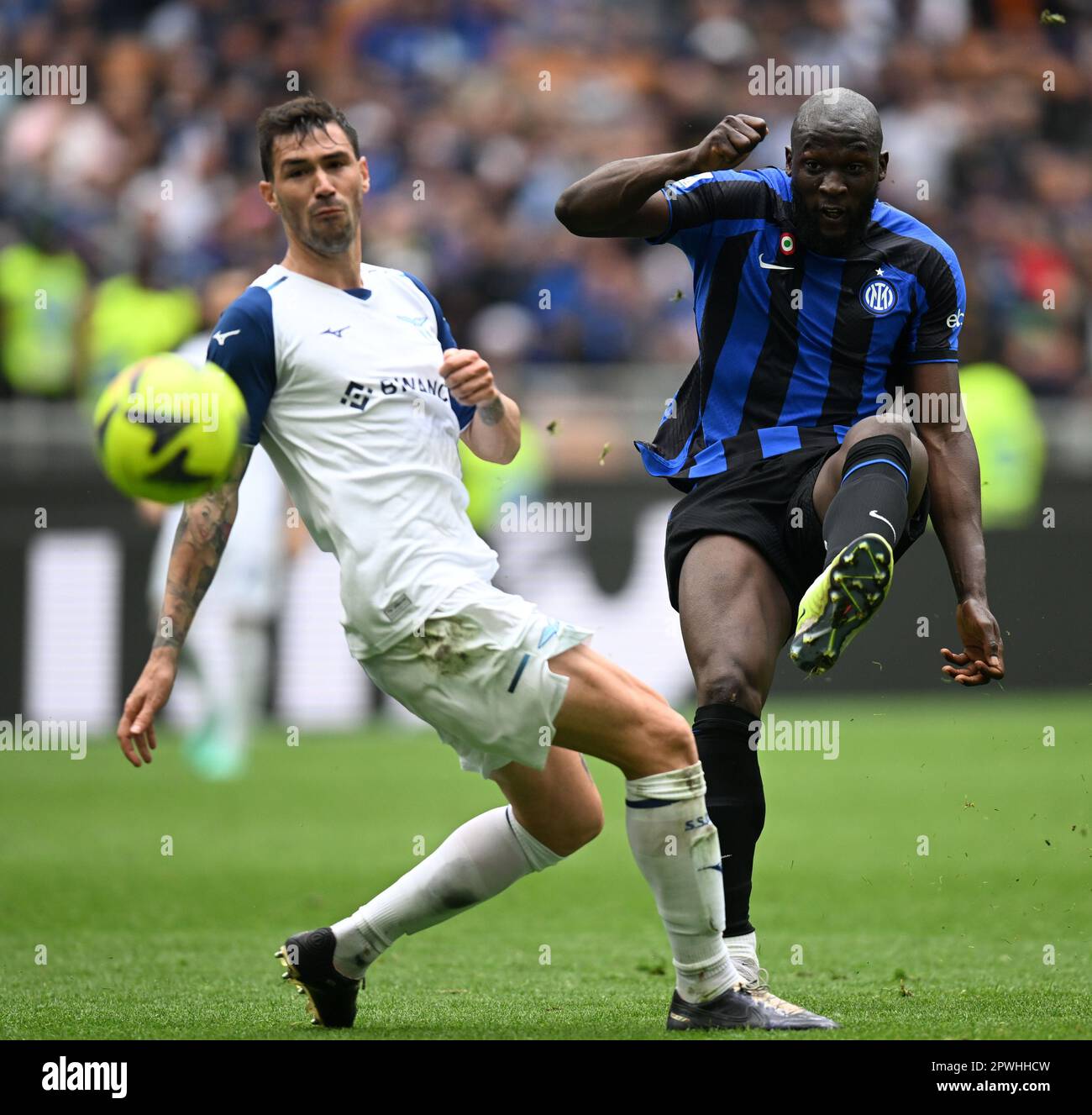 Milan. 30th Apr, 2023. FC Inter's Romelu Lukaku (R) vies with Lazio's Alessio Romagnoli during a ...