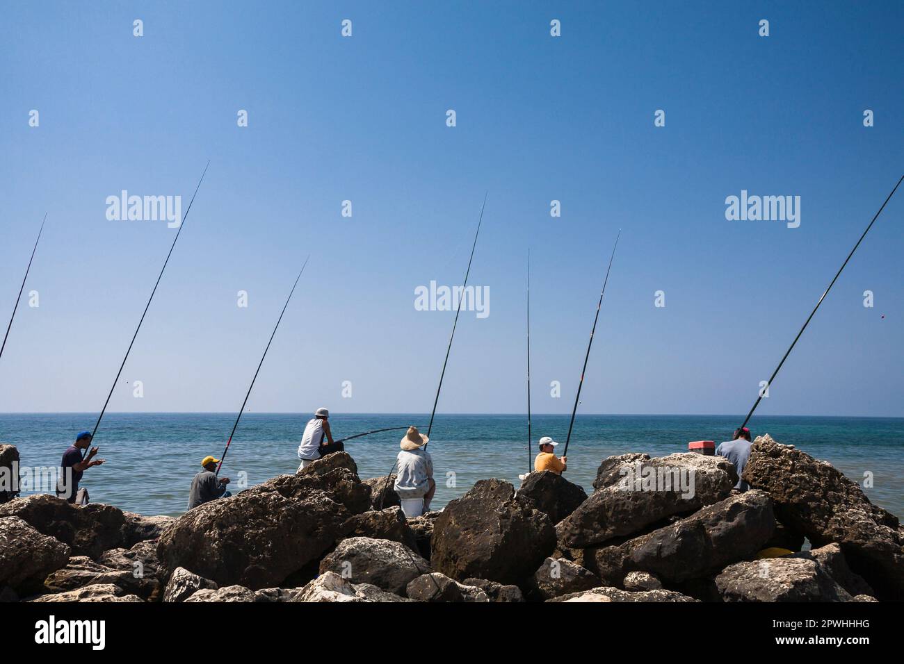 Anglers at rock reef, of peninsula, mediterranean sea, Tyre(Sour,Sur ...
