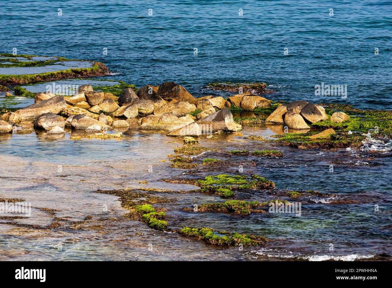 Ancient stone columns at rock reef, tip of peninsula(ancient island ...