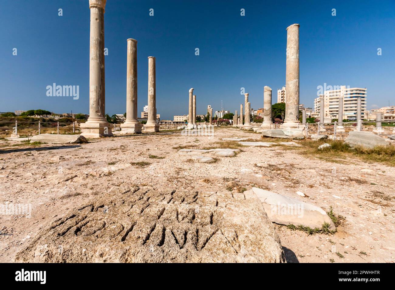 Roman ruins and columns at tip of Tyre peninsula, mediterranean sea ...