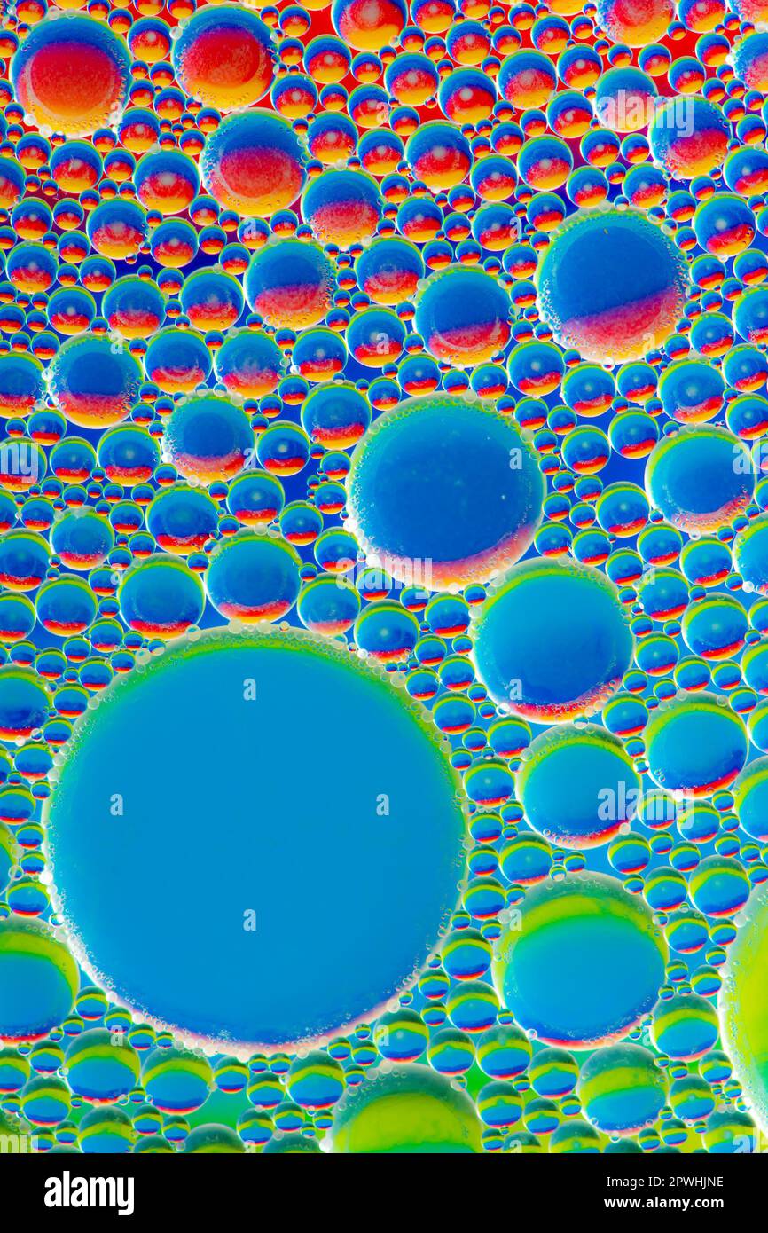 Colorful abstract macro background with oil drops in water Stock Photo ...
