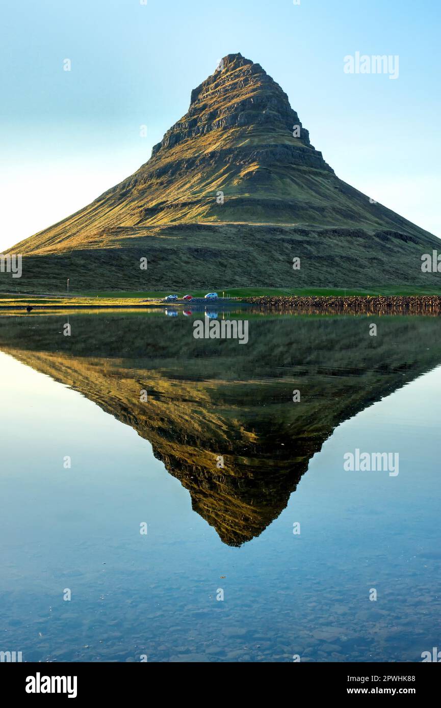 The famous Mount Kirkjufell in Iceland reflected in a lake Stock Photo ...