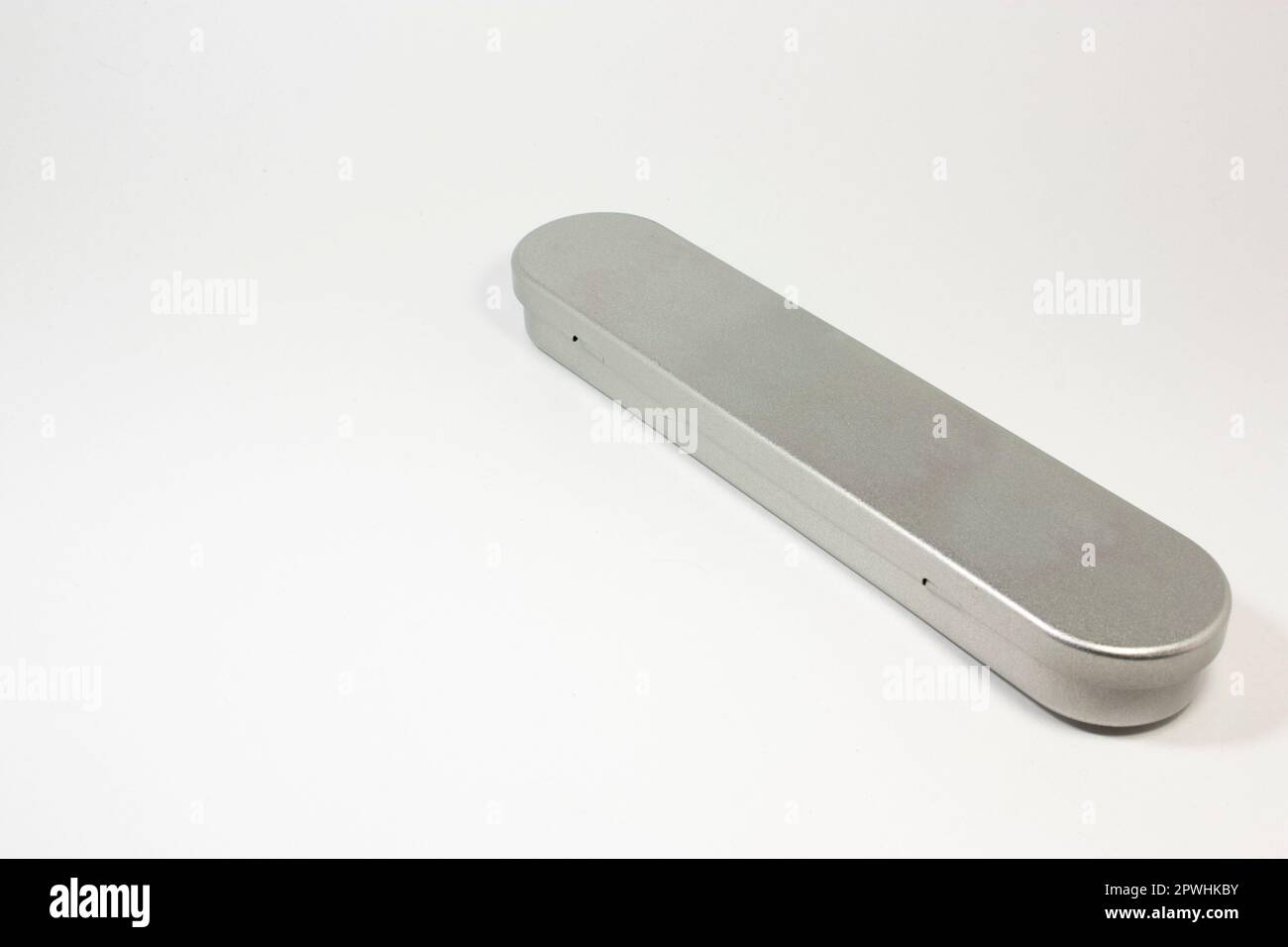 Empty metal long box on white background Stock Photo - Alamy