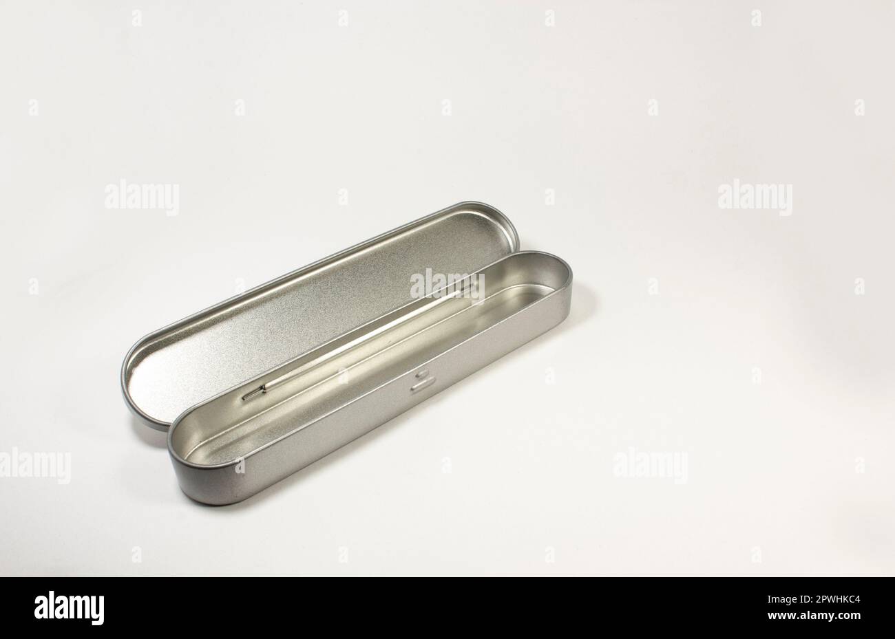 Empty metal long box on white background Stock Photo - Alamy
