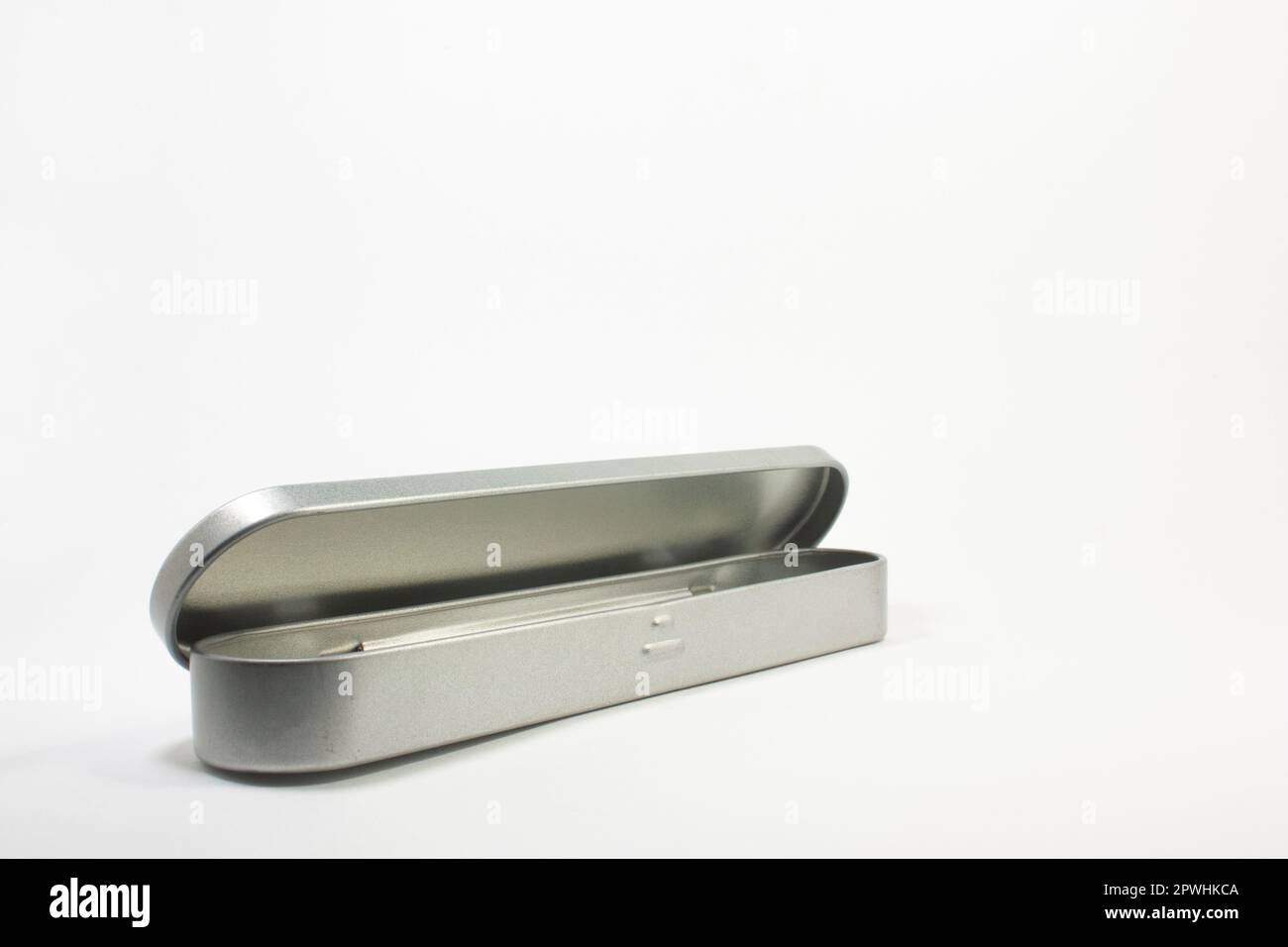 Empty metal long box on white background Stock Photo - Alamy