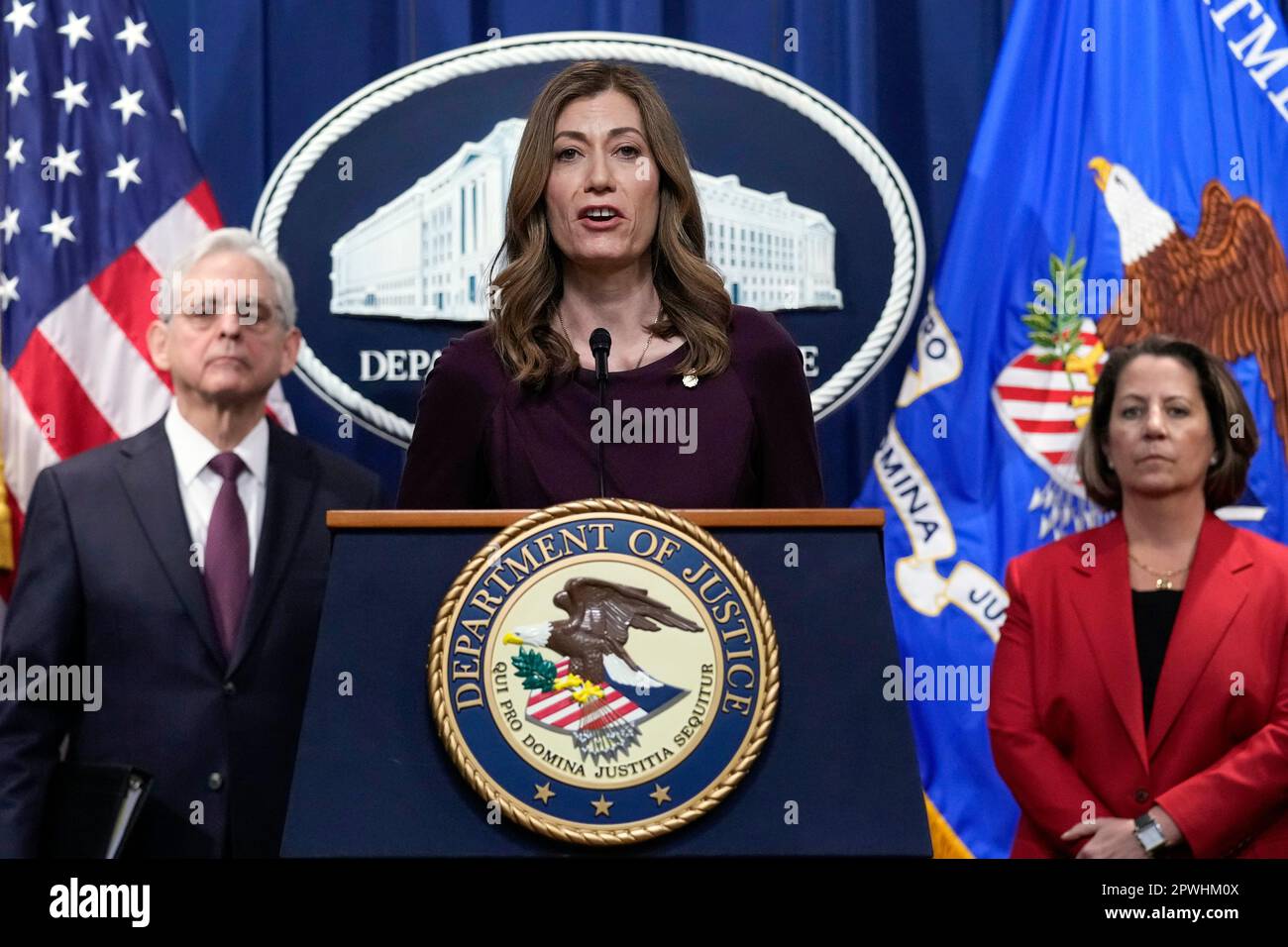 FILE - DEA Administrator Anne Milgram, center, flanked by Attorney ...