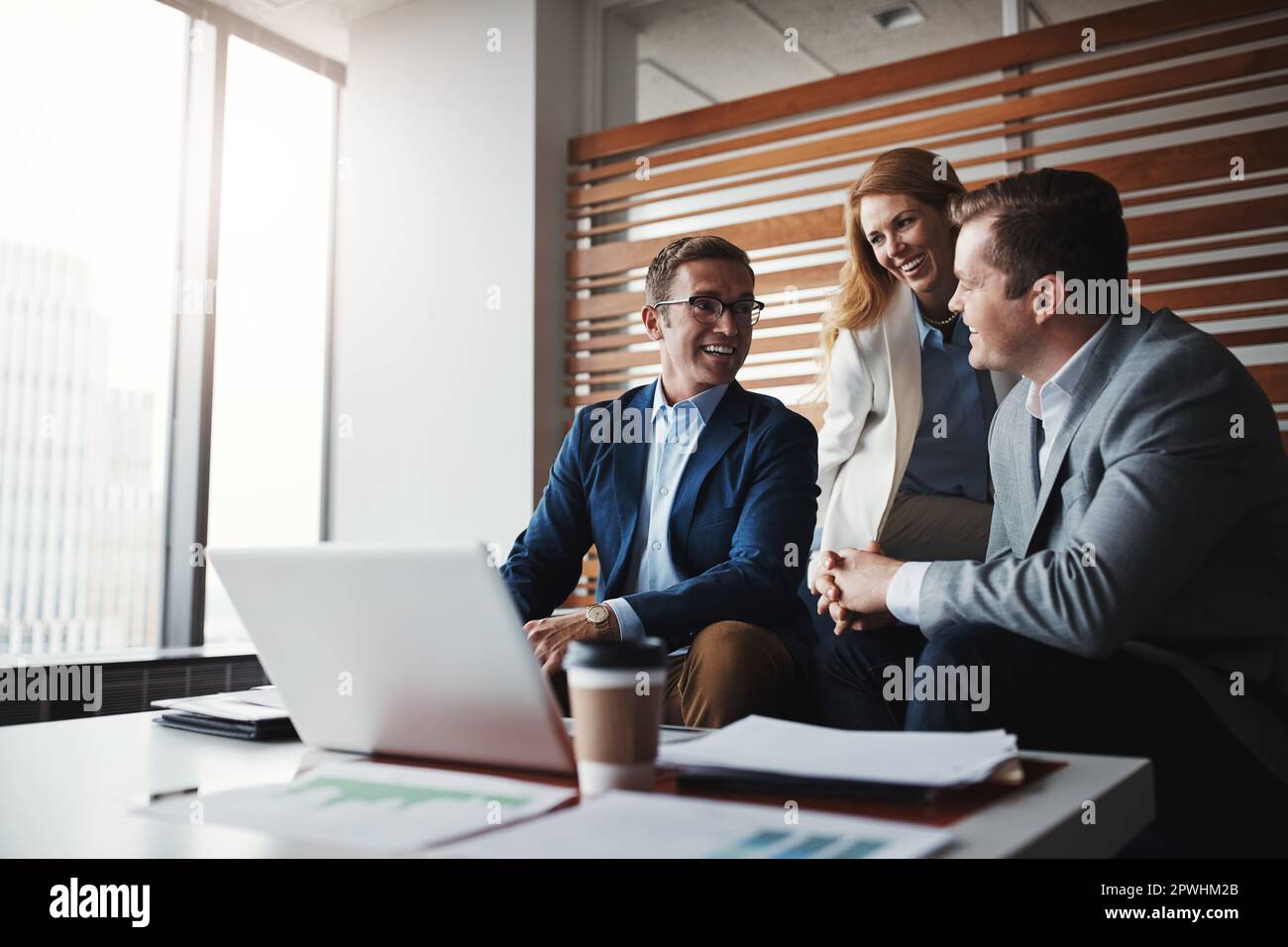 Working as a team of high-ranking executives. a group of businesspeople ...