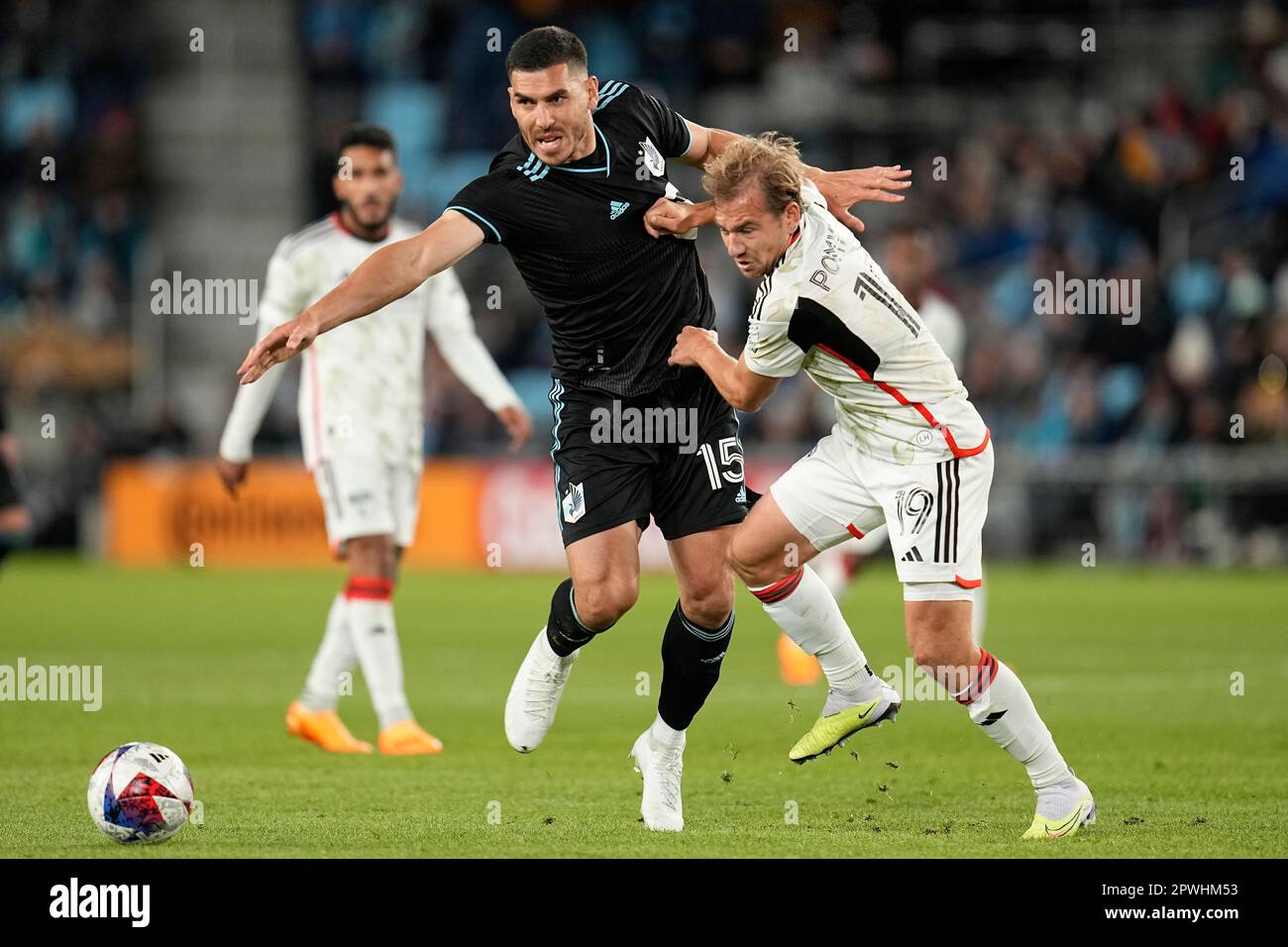 Minnesota United defender Michael Boxall (15) and FC Dallas midfielder ...