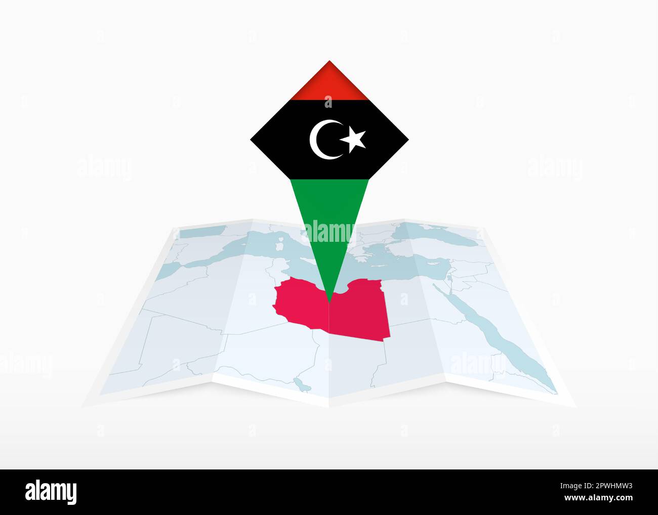 Libya is depicted on a folded paper map and pinned location marker with ...