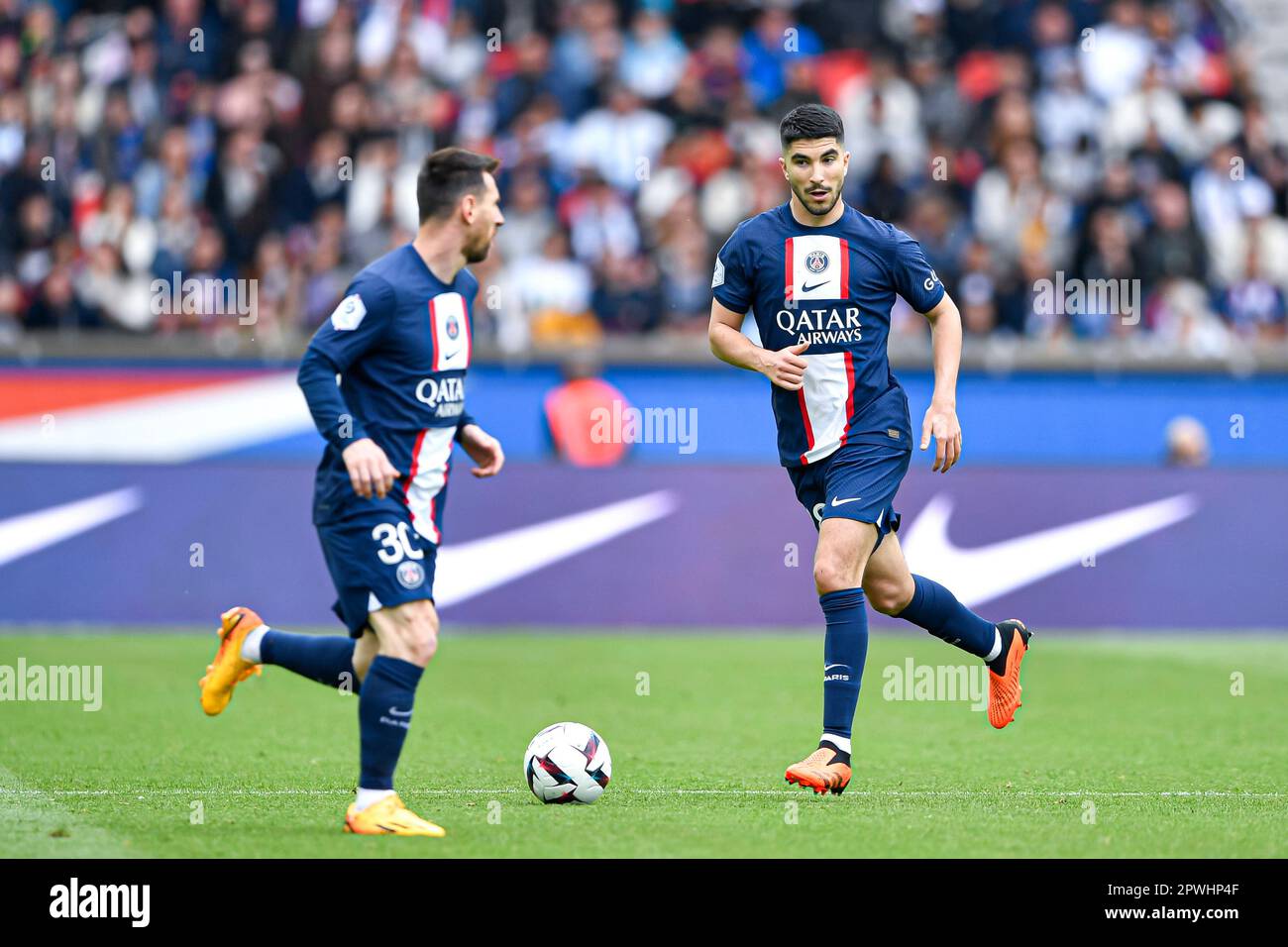 Paris, France. 30th Apr, 2023. Leo Lionel Messi and Carlos Soler Barragan during the Ligue 1 ...