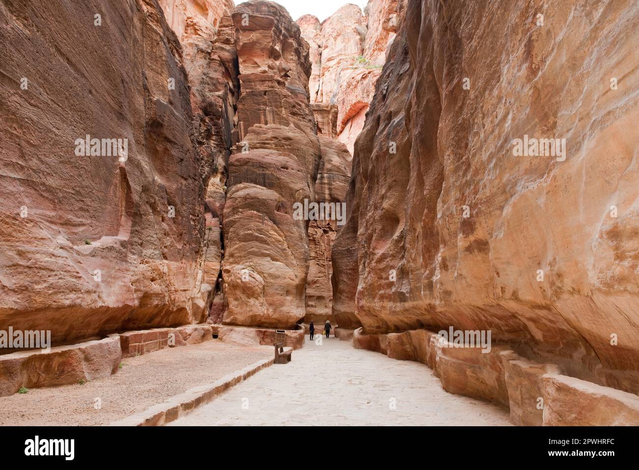 Ancient water conduit in Siq, canyon, gorge, ancient paving stones ...