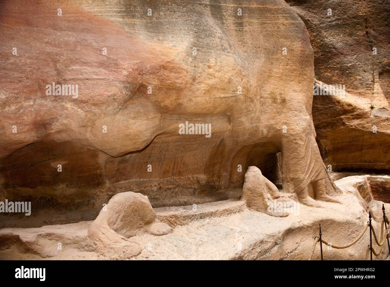 Weathered sandstone sculpture, caravan leader, camel driver, camel ...