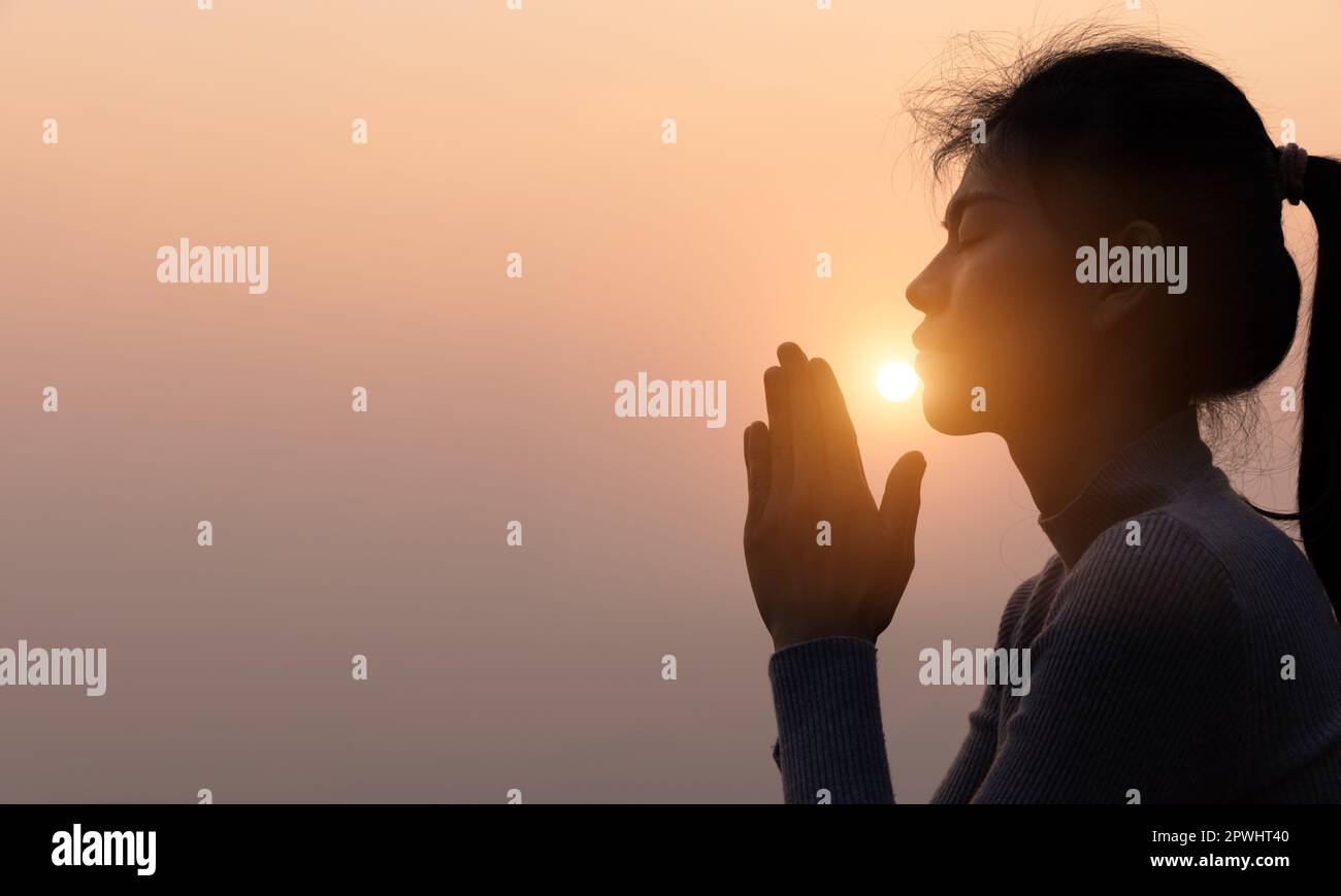 woman Praying hands with faith in religion and belief in God On the ...