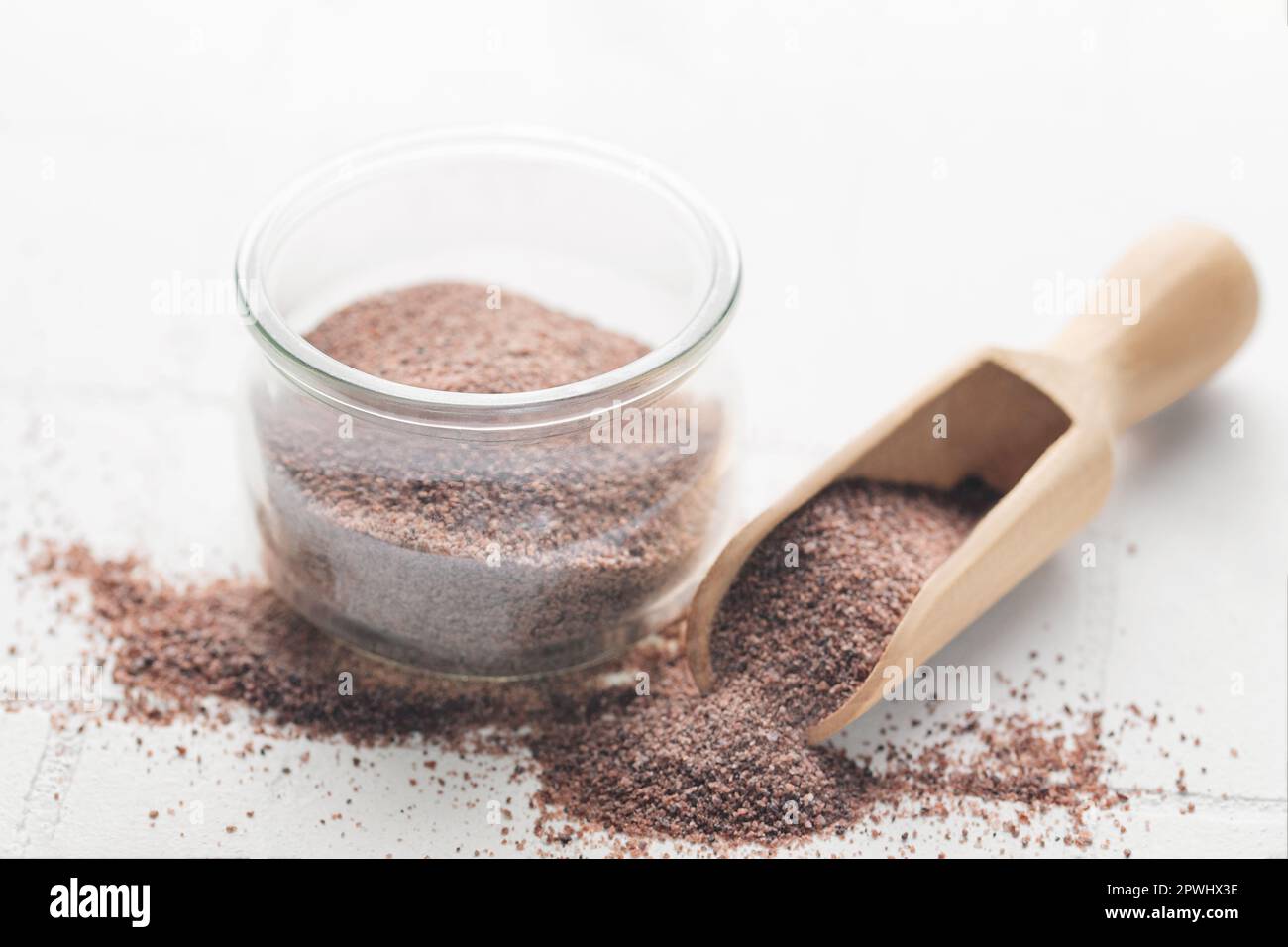 Jar of India black kala namak salt. Healthy food concept. Speciality ...