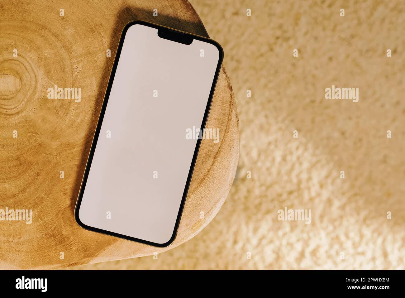 Smart phone mock-up in natural light, phone with white screen on small ...