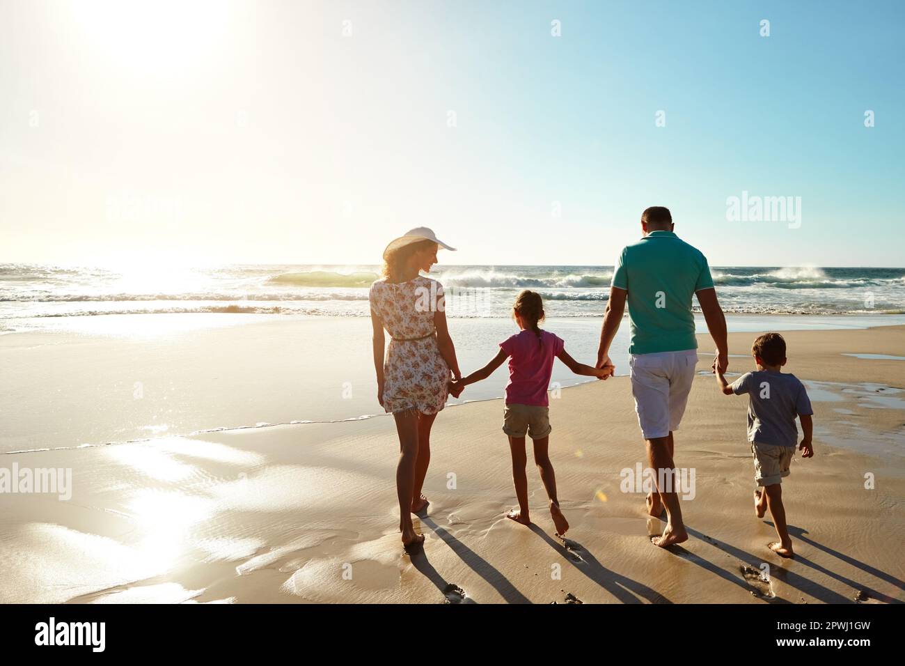 Strengthening family bonds at the beach. a family enjoying some quality ...