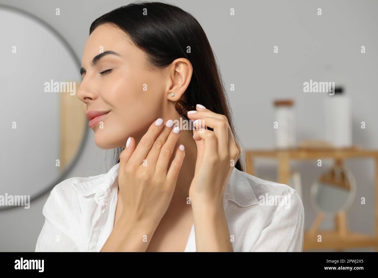 Apply oil to neck hi-res stock photography and images - Alamy