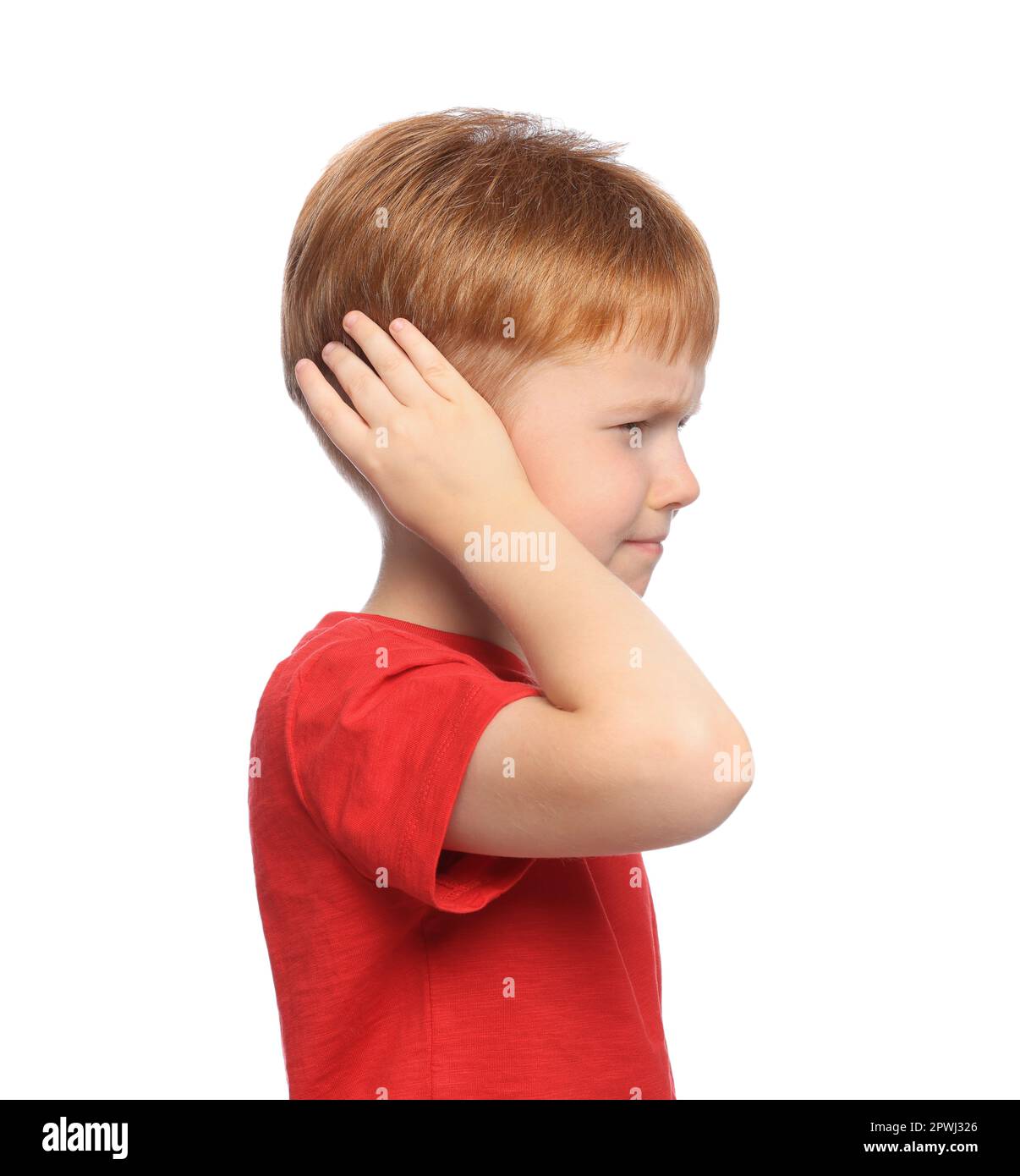 Little boy suffering from ear pain on white background Stock Photo - Alamy