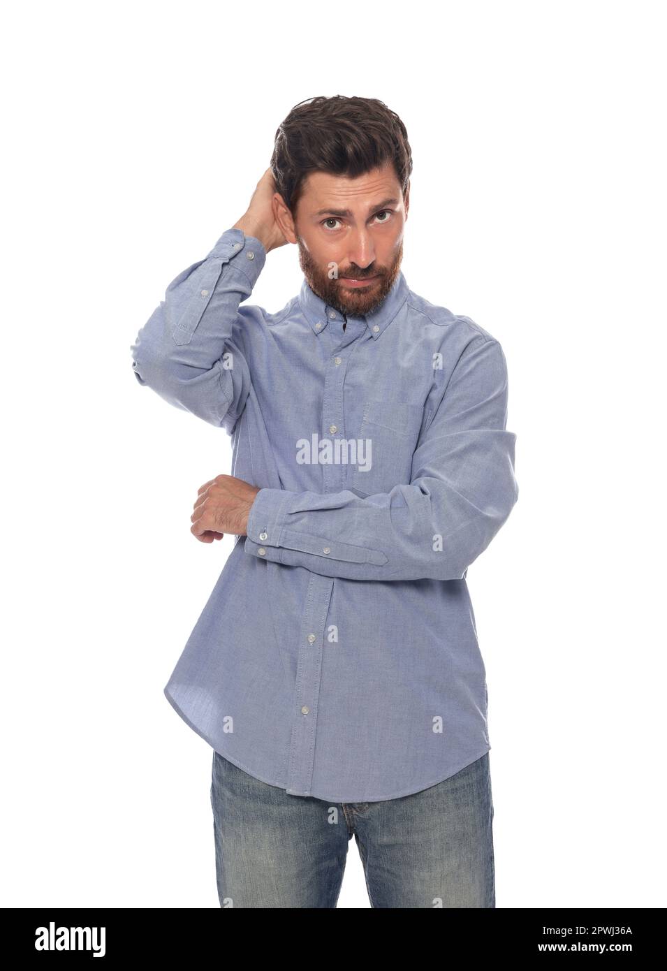 Embarrassed man in shirt on white background Stock Photo - Alamy