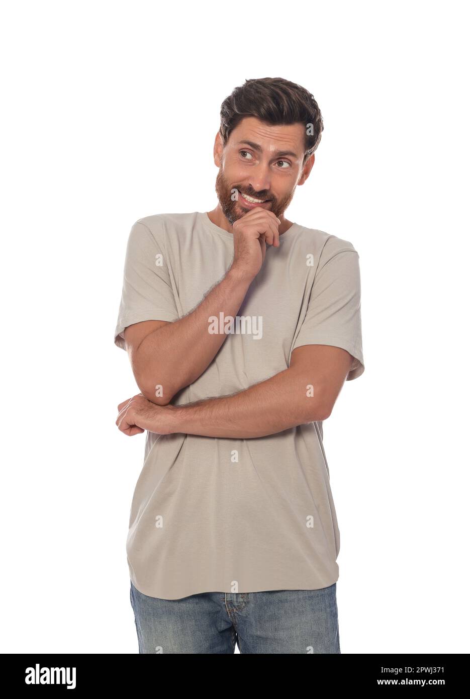Embarrassed man in shirt on white background Stock Photo - Alamy