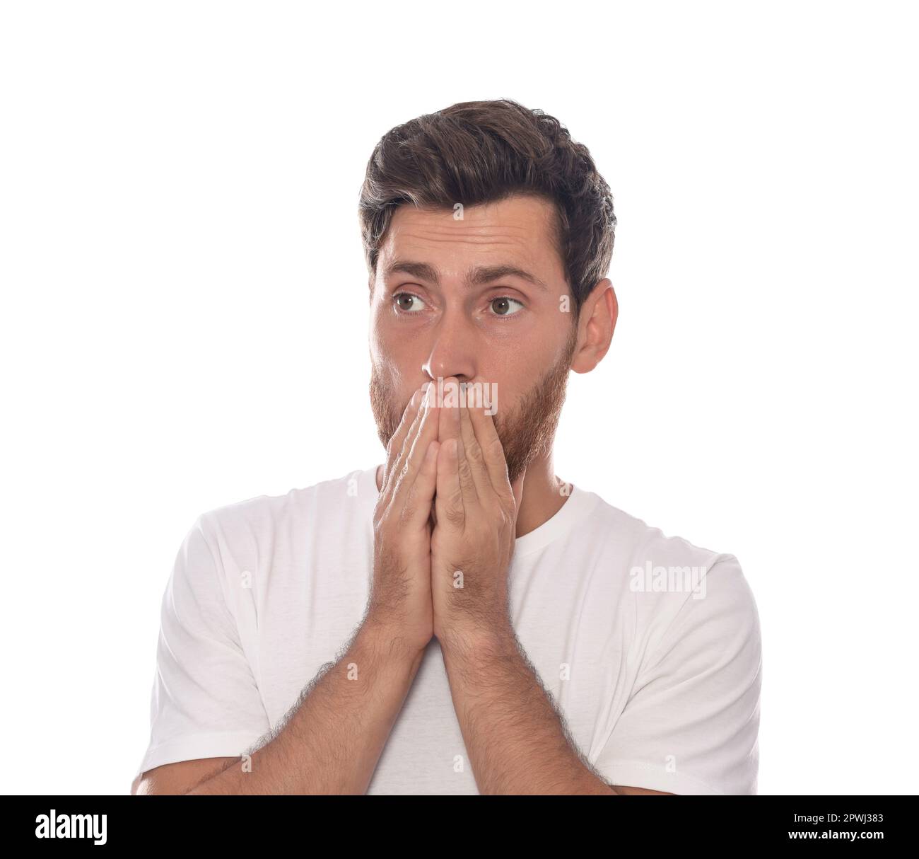 Embarrassed man covering face with hands on white background Stock ...
