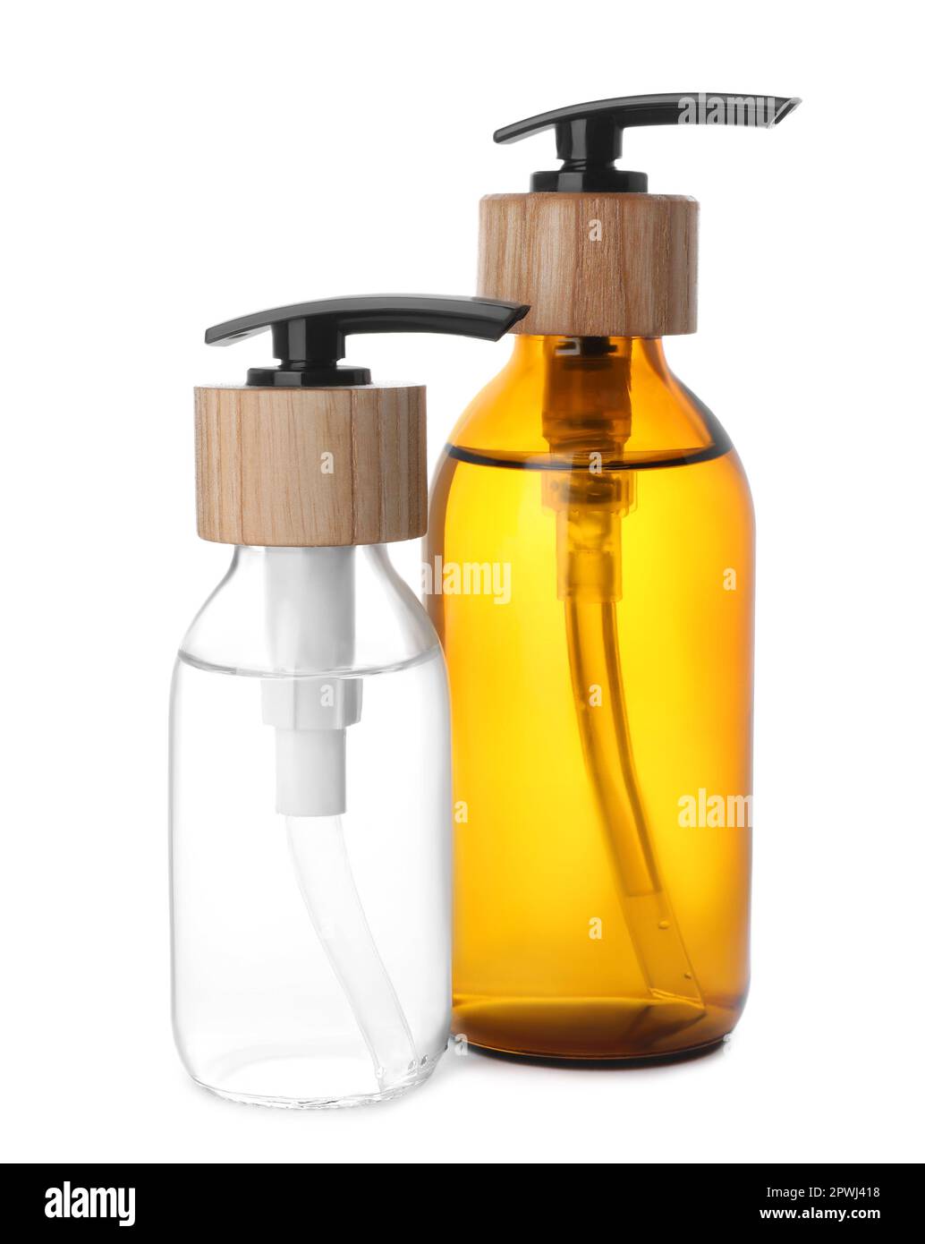 Bottles with dispenser caps on white background Stock Photo - Alamy