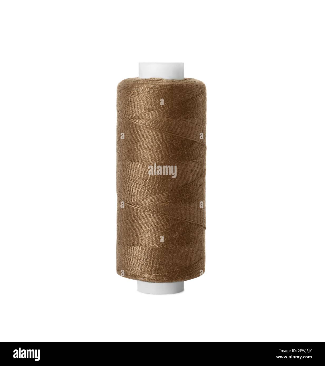 Spool of brown sewing thread isolated on white Stock Photo - Alamy