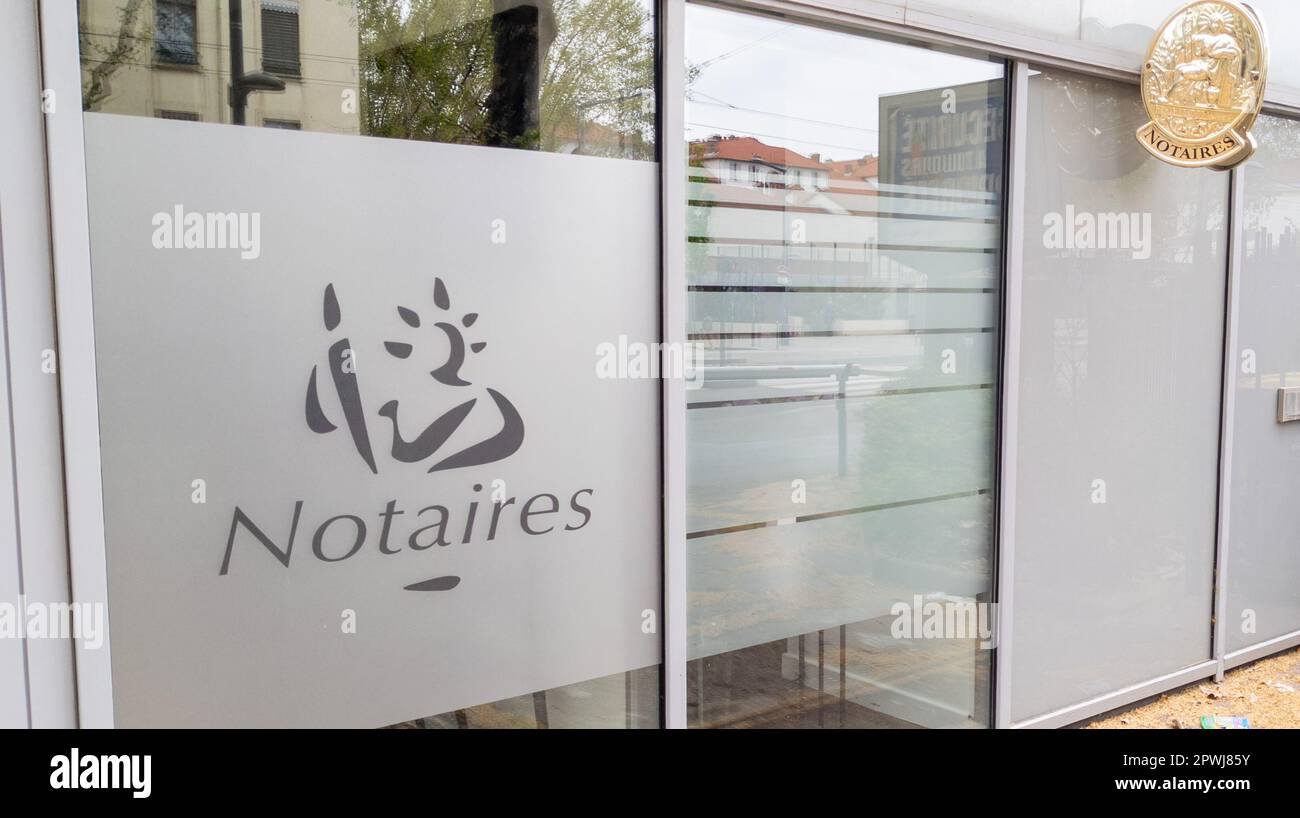 lyon , Aura France - 04 24 2023 : Notaire entrance door french sign ...