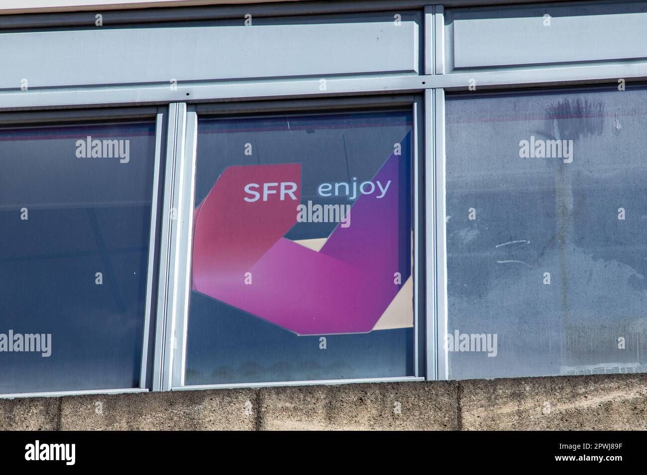 lyon , Aura France - 04 24 2023 : SFR store enjoy logo brand and text ...