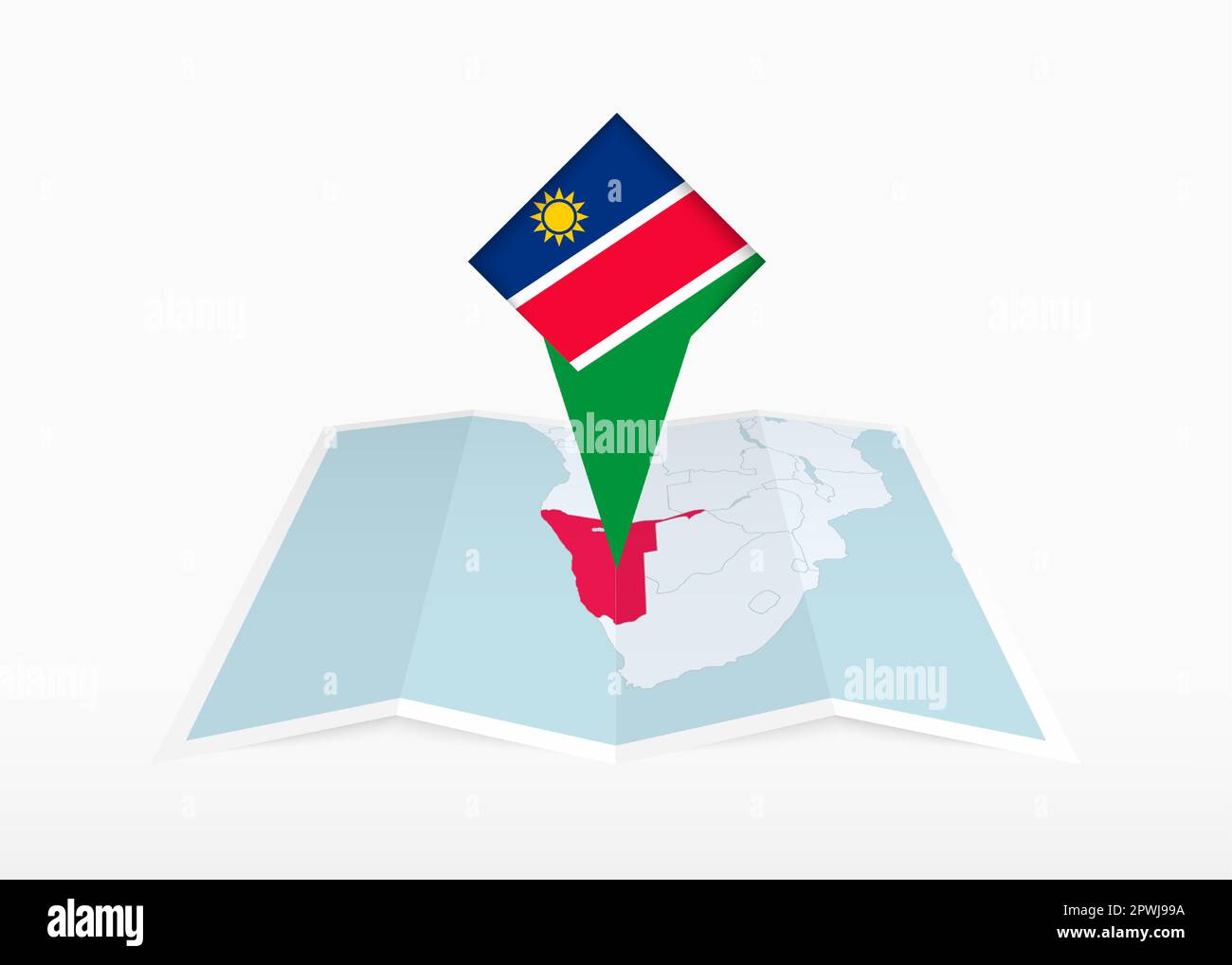 Namibia is depicted on a folded paper map and pinned location marker ...