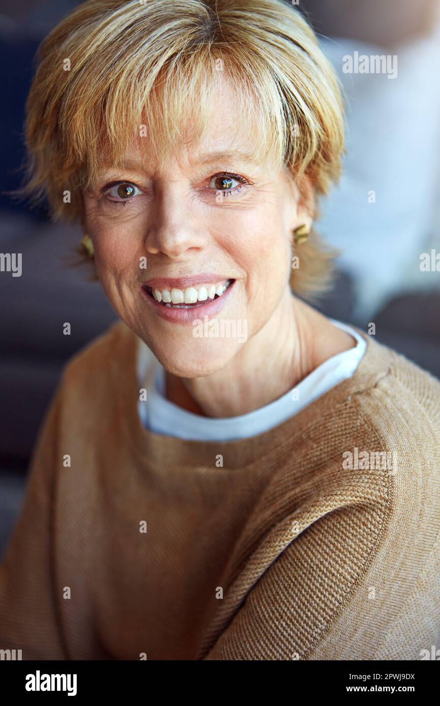 Having a happy and relaxed retirement. Portrait of a happy mature woman ...