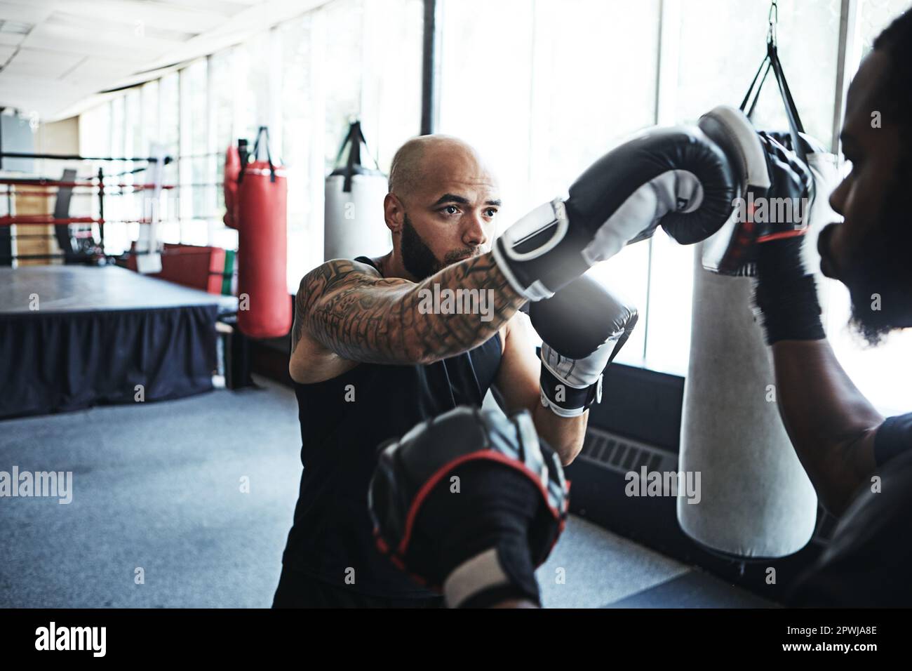 Follow your dreams, they know the way. a male boxer practising his ...