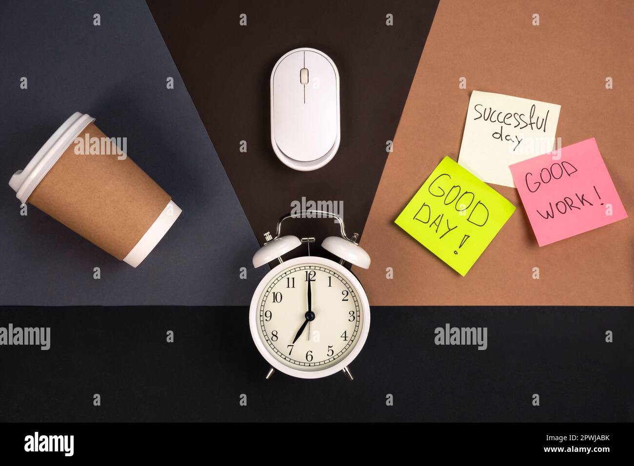 Alarm clock, computer mouse, paper cup and bright paper stickers, top ...