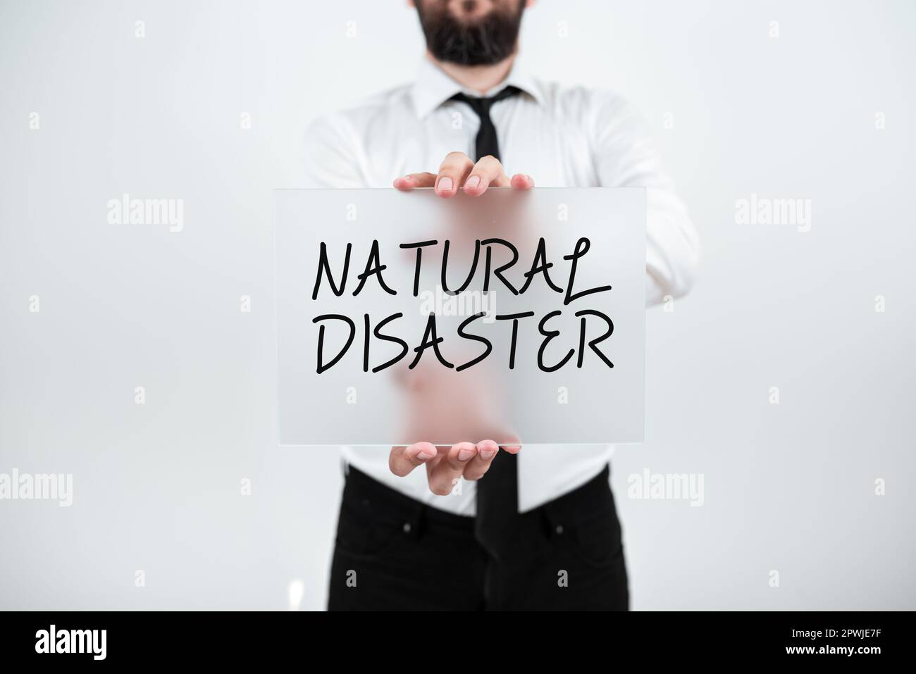 Hand writing sign Natural Disaster, Word Written on occurring in the ...
