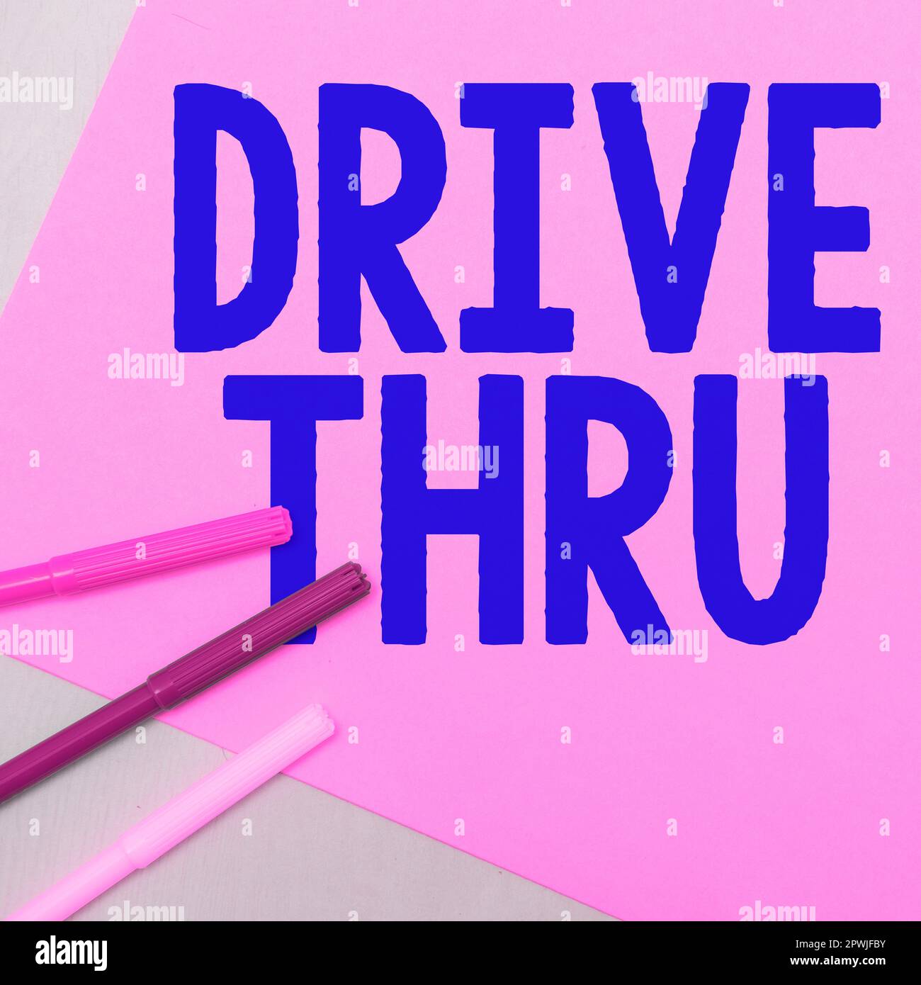 Hand writing sign Drive Thru, Business approach place where you can get ...