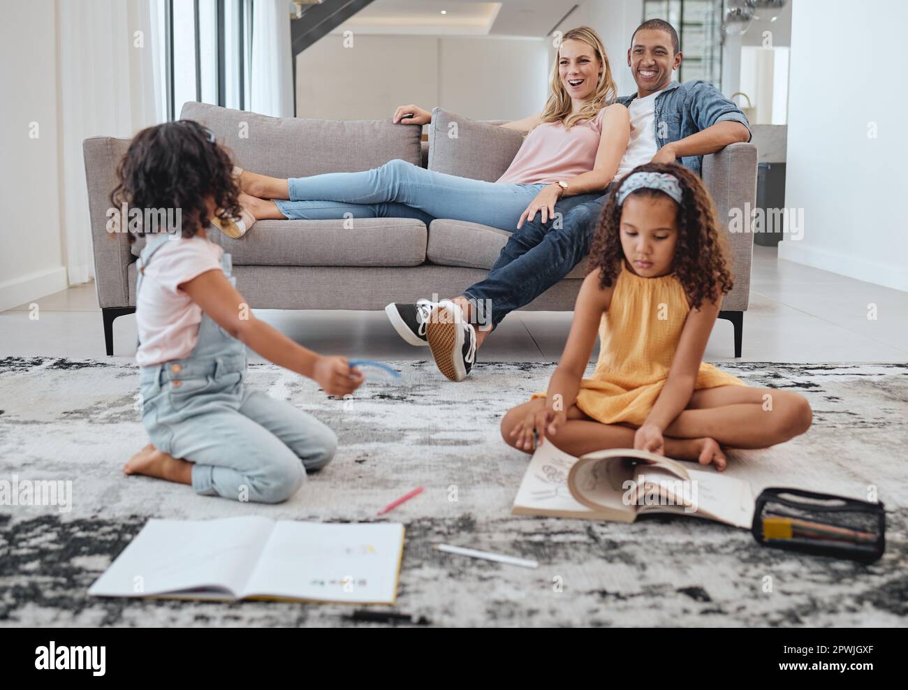 Learning, education and kids with family in living room studying. Home ...