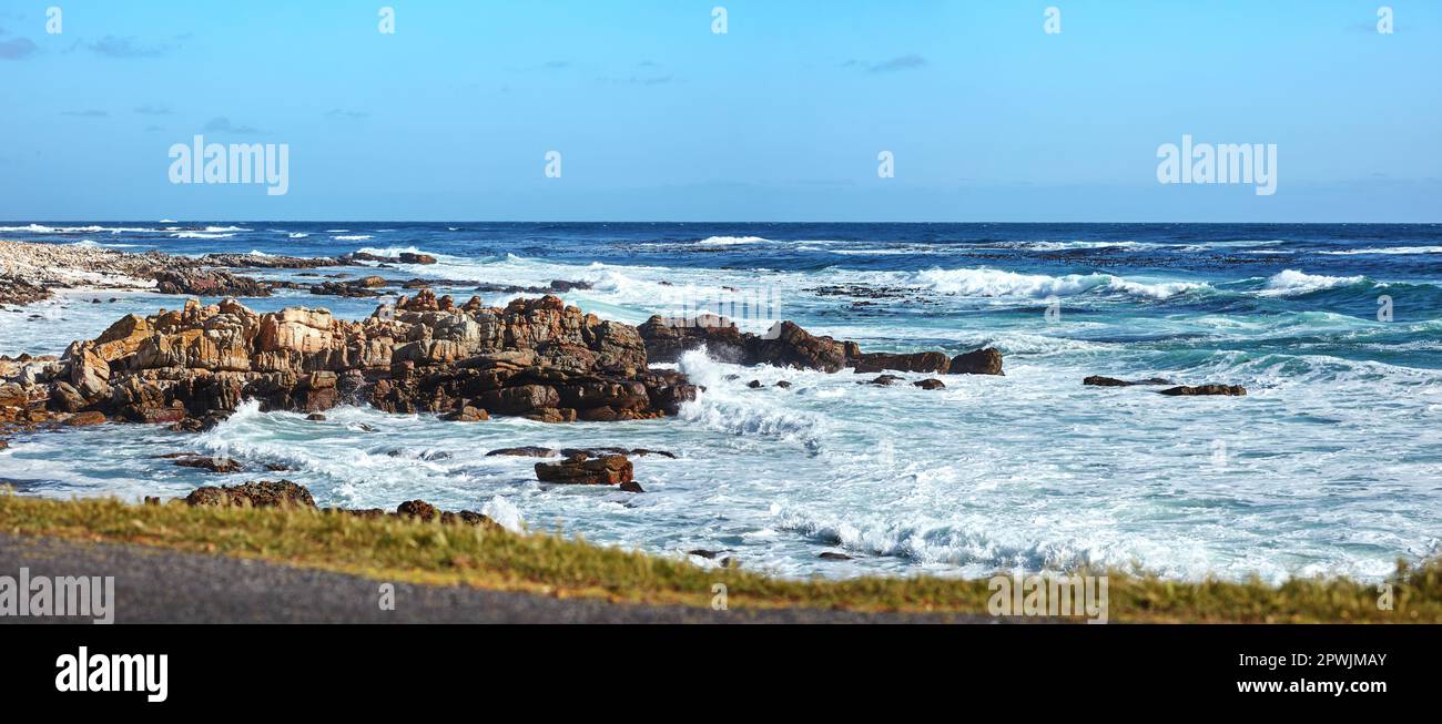 Stunning blue ocean coast with a clear sky background and copy space ...