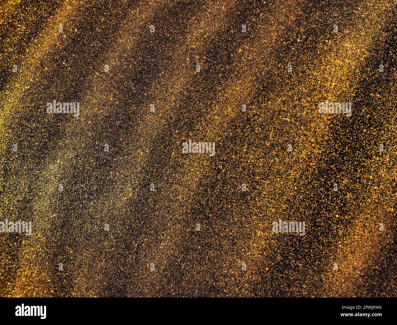 Bokeh light of gold glitters. Golden glitter texture background ...