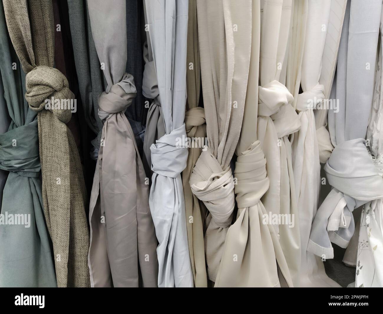 Curtain and fabric for drapery and interior decoration. Samples of gray ...