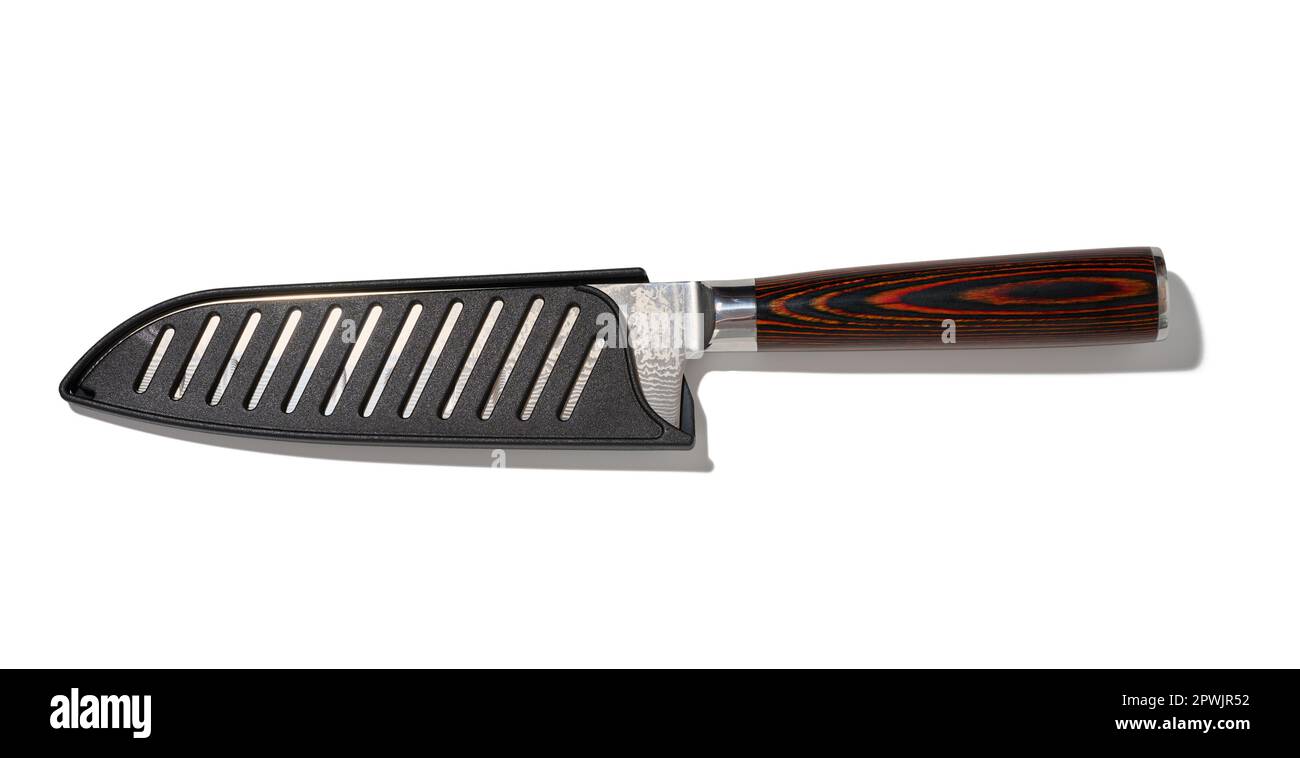 Large kitchen knife in a plastic sheath on a white isolated background ...