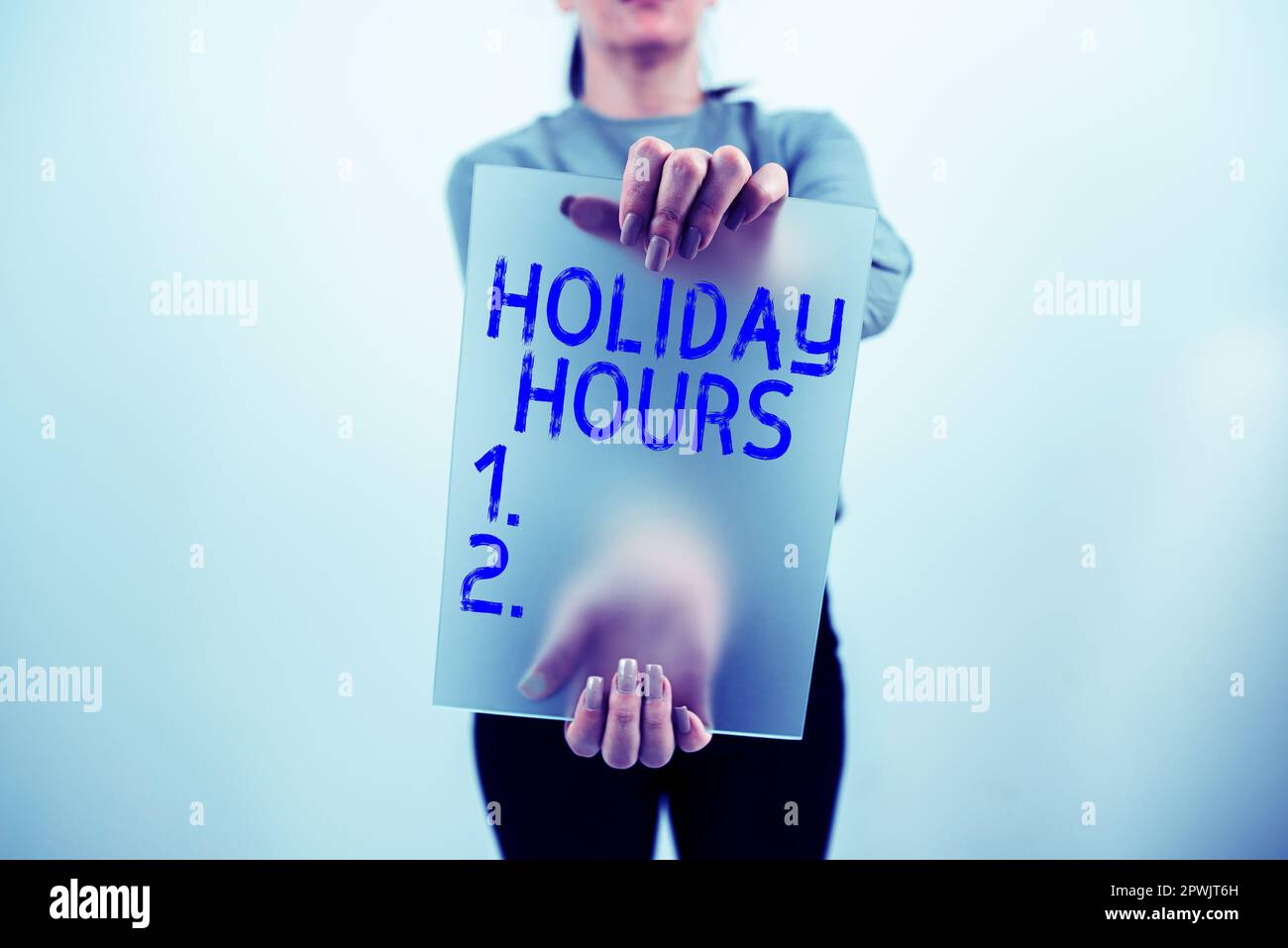Sign displaying Holiday Hours, Conceptual photo bonus payment an ...