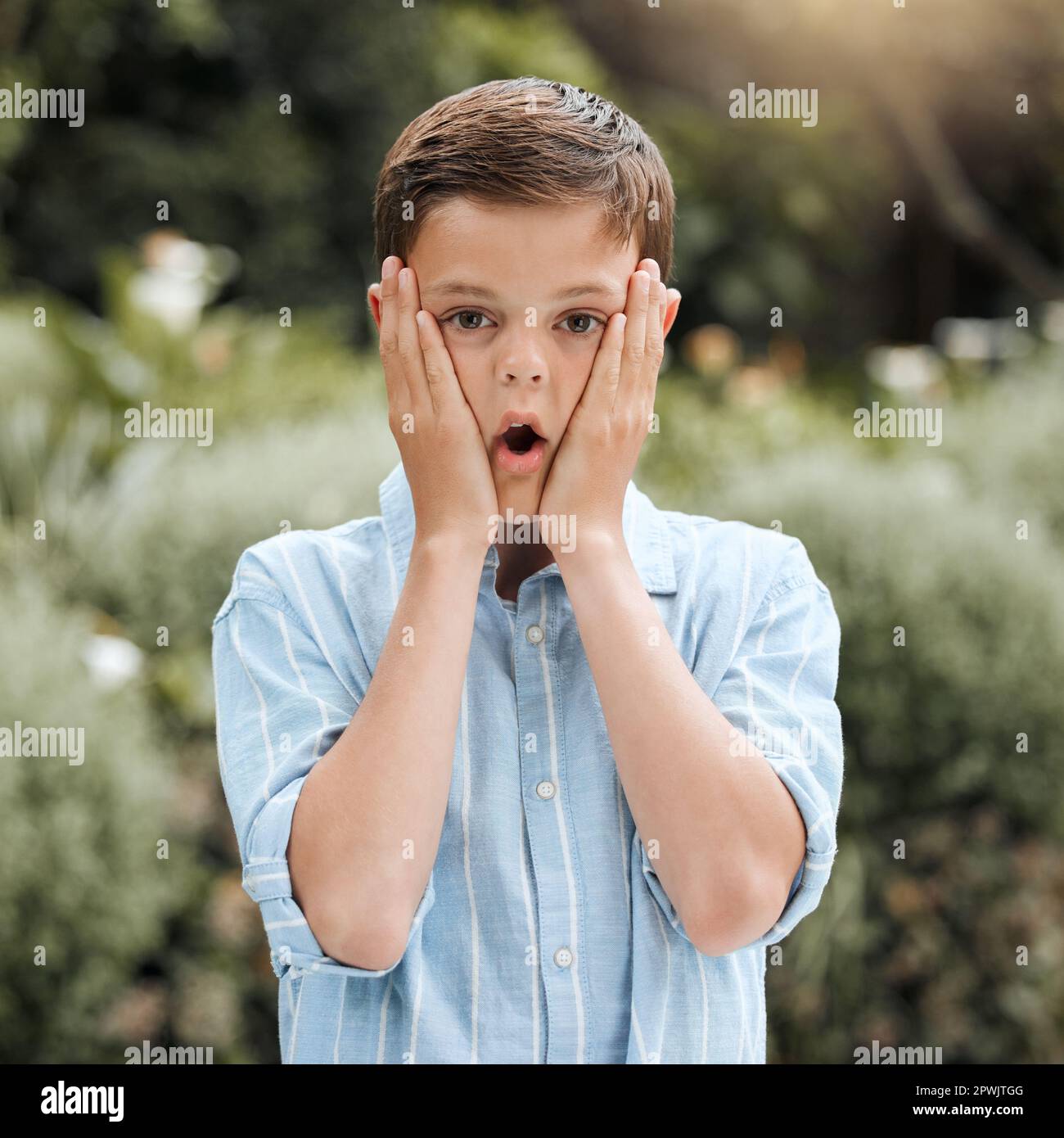 This kids going crazy. an adorable little boy looking surprised while ...