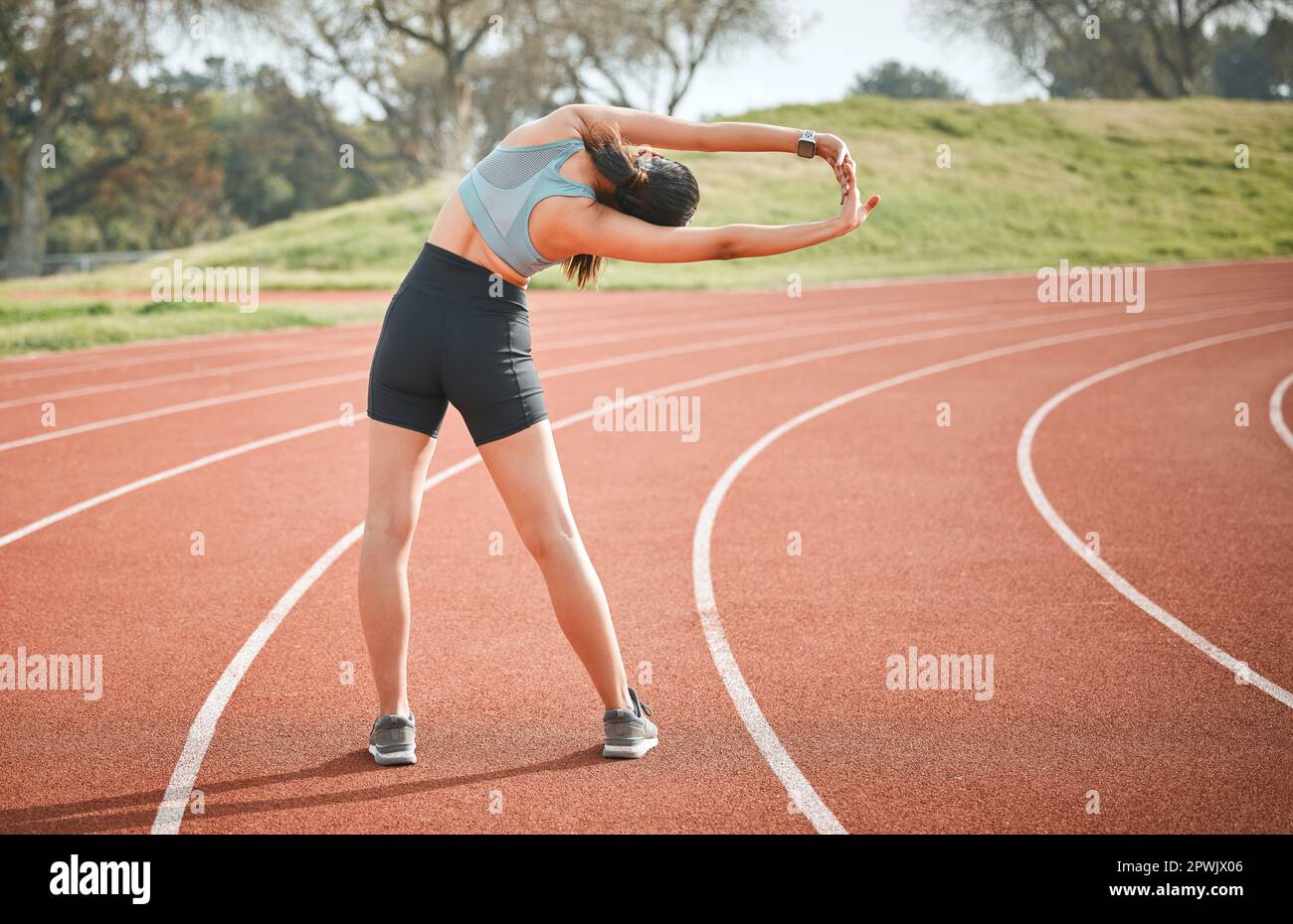 Stretching is a powerful signal to strengthen muscles. Rearview shot of ...