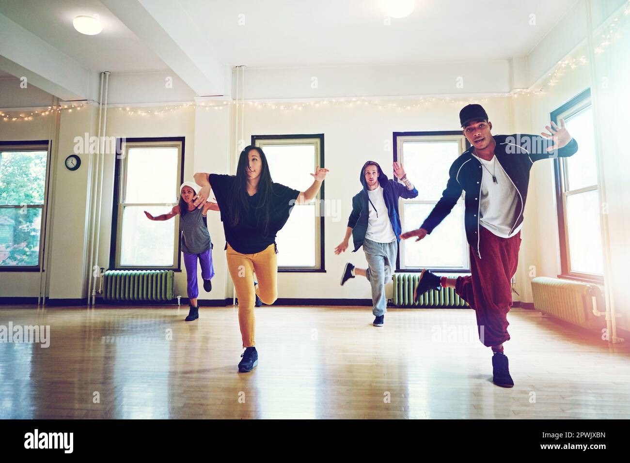 Practicing for the top spot in the dance championships. a group of ...