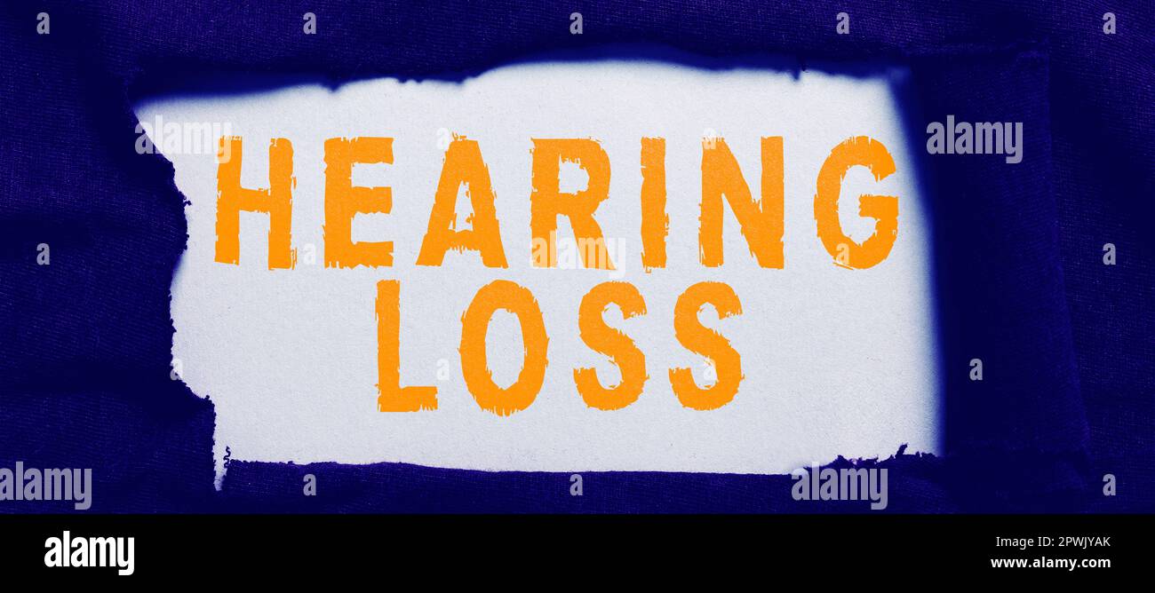 Hand writing sign Hearing Loss, Concept meaning is partial or total ...