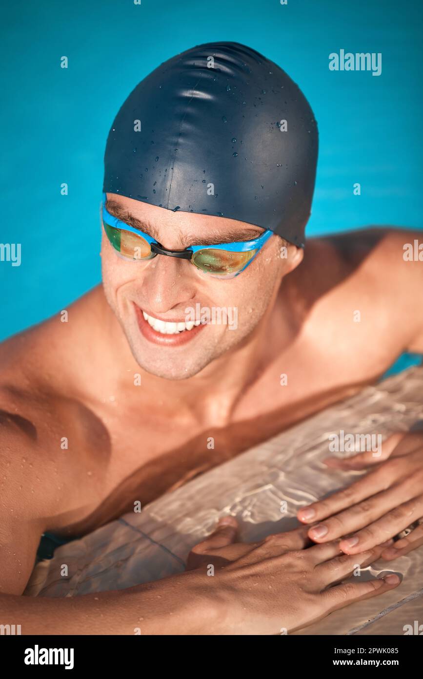 Dominating the water. a handsome young male athlete swimming in an ...